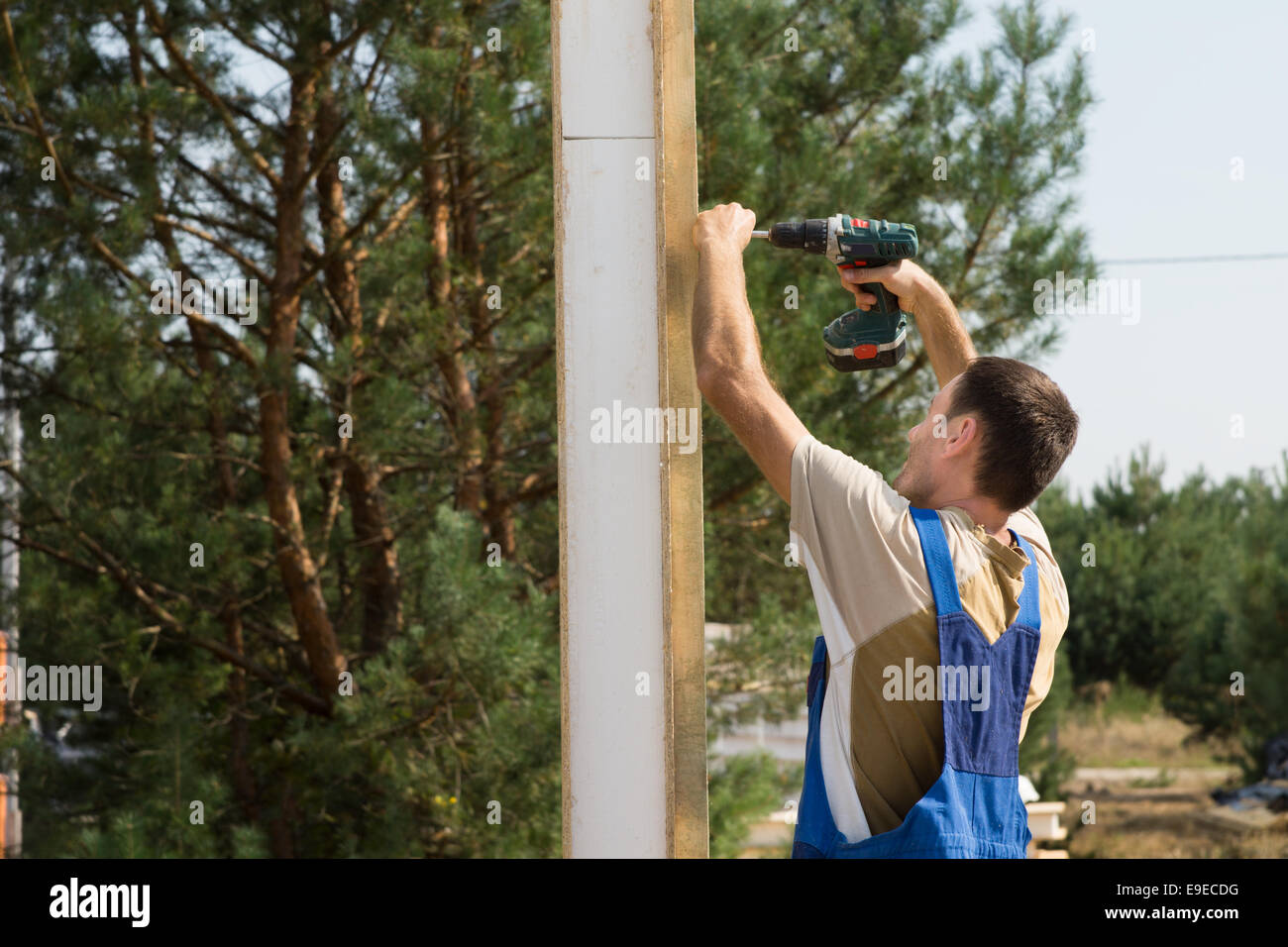 Solo Young Construction Man Using Cordless Drill Device in Building ...