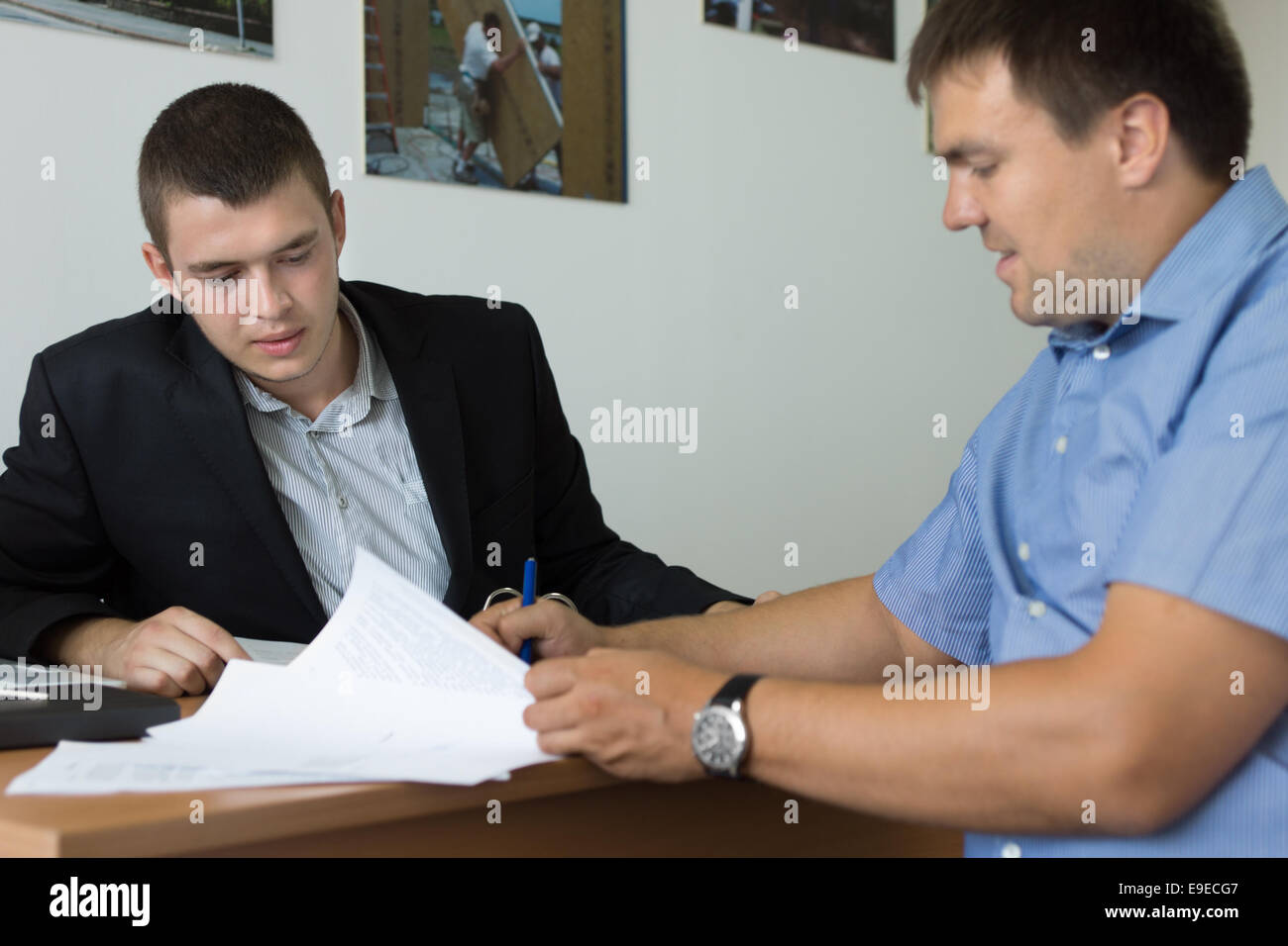 Men signing up for draft hi-res stock photography and images - Alamy