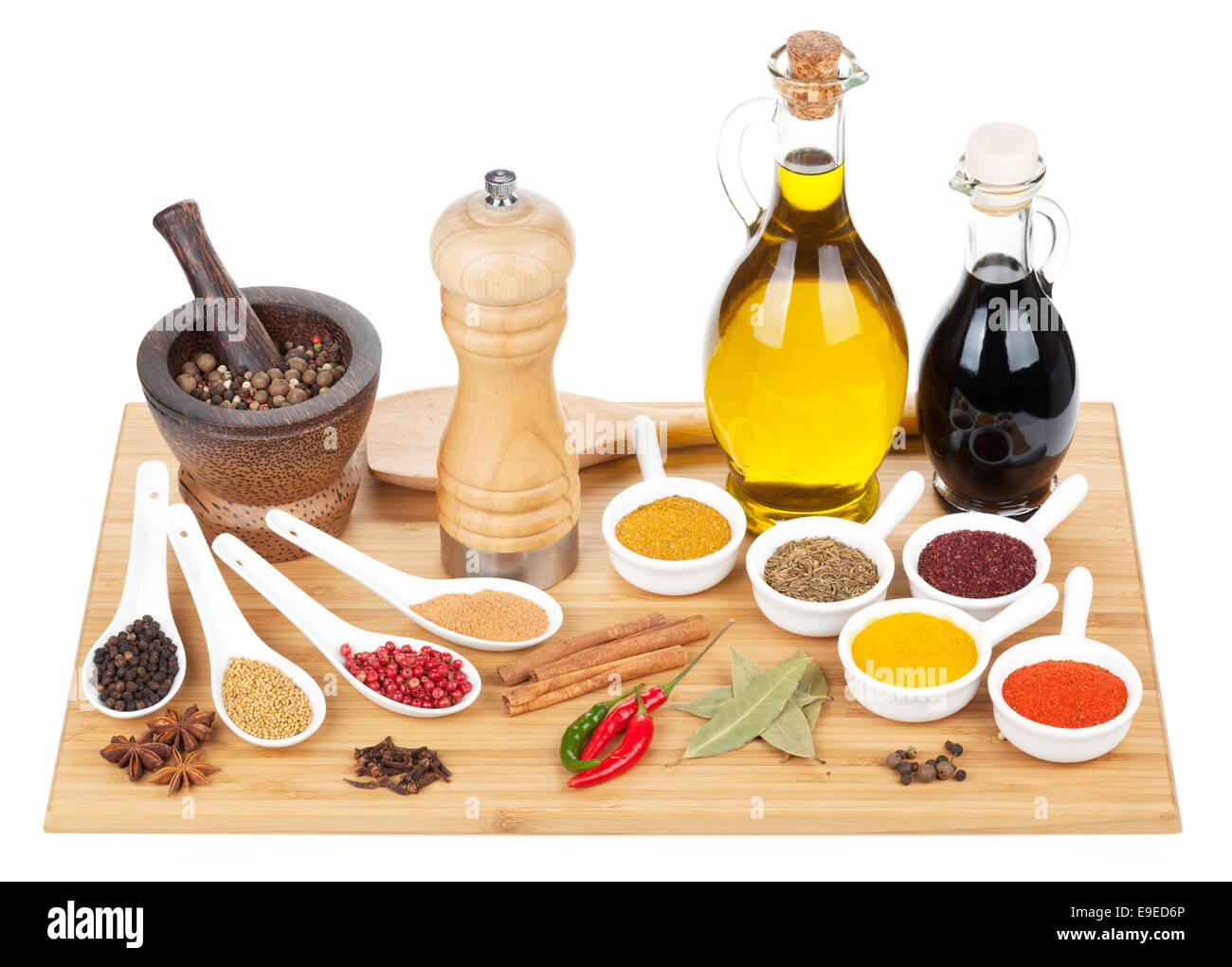 Various spices selection on cutting board. Isolated on white background ...