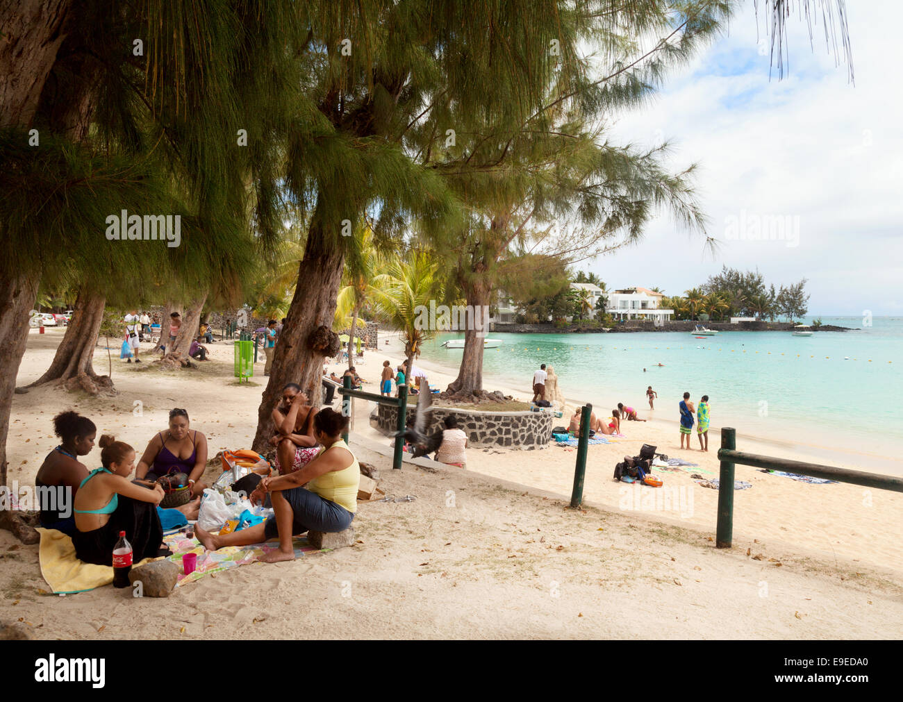 Local people and tourists relaxing on Pereybere public beach, north ...
