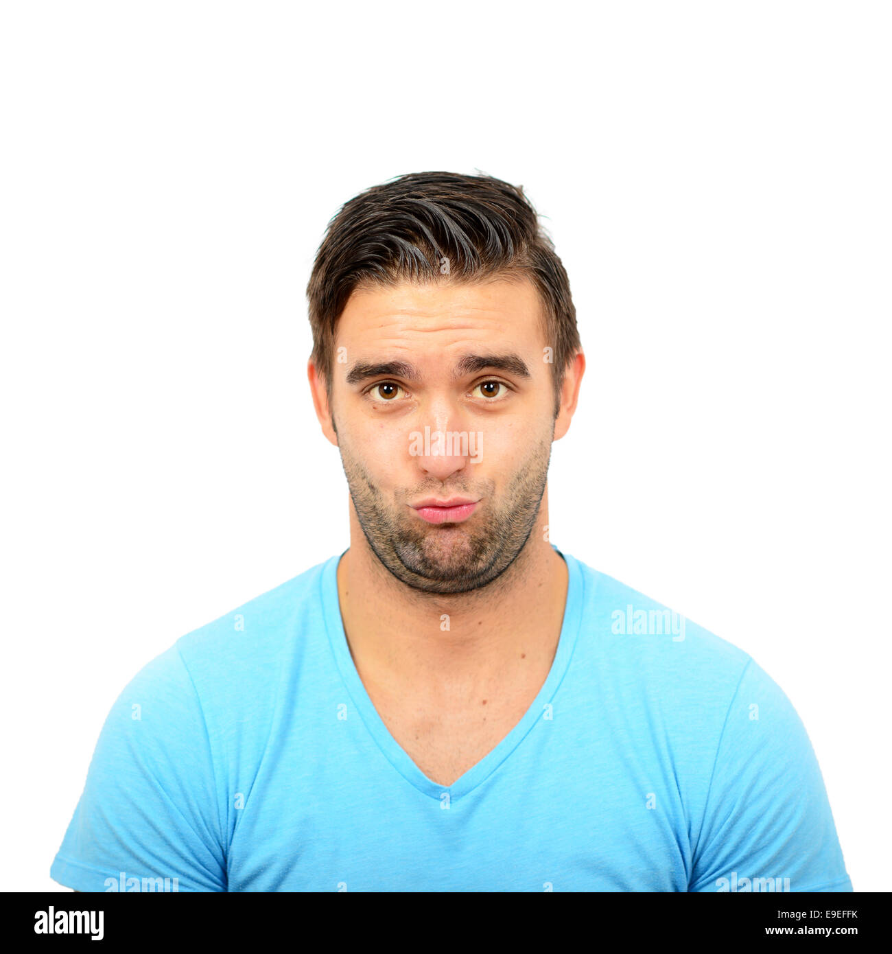 Portrait of clueless man against white background Stock Photo - Alamy