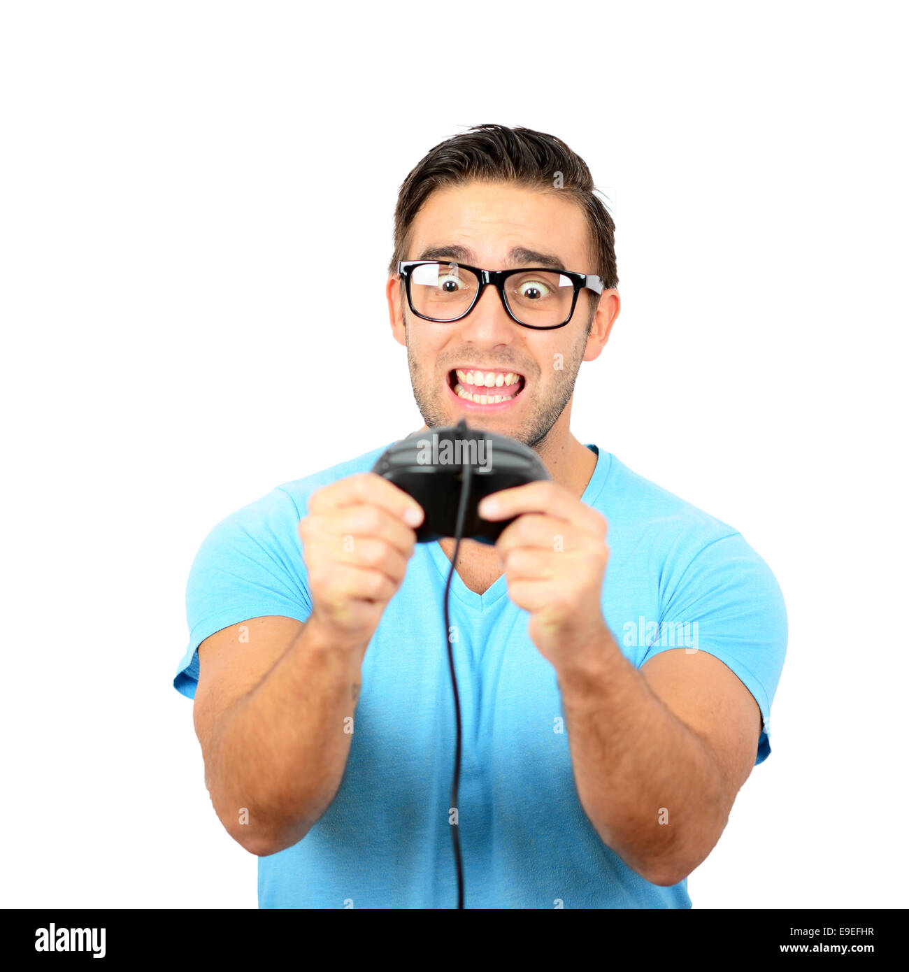 Portrait of handsome man holding joystick for video games against white ...