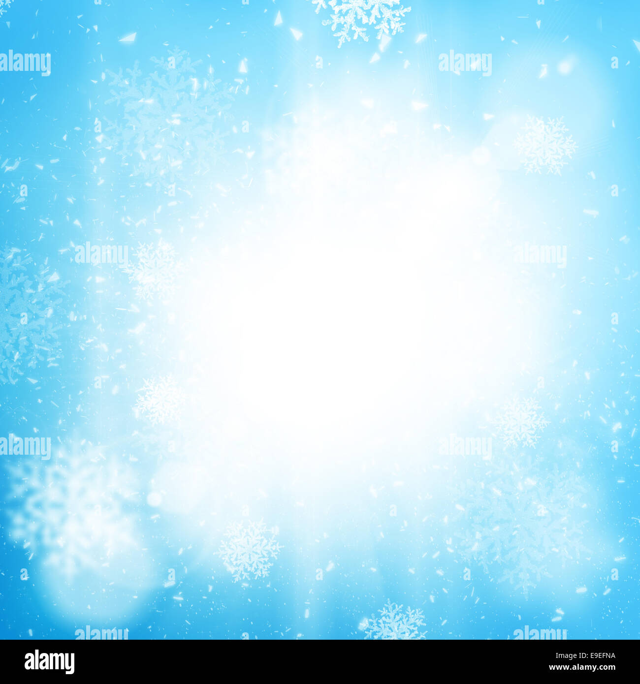 Bright sun light sky background with snow flakes Stock Photo - Alamy