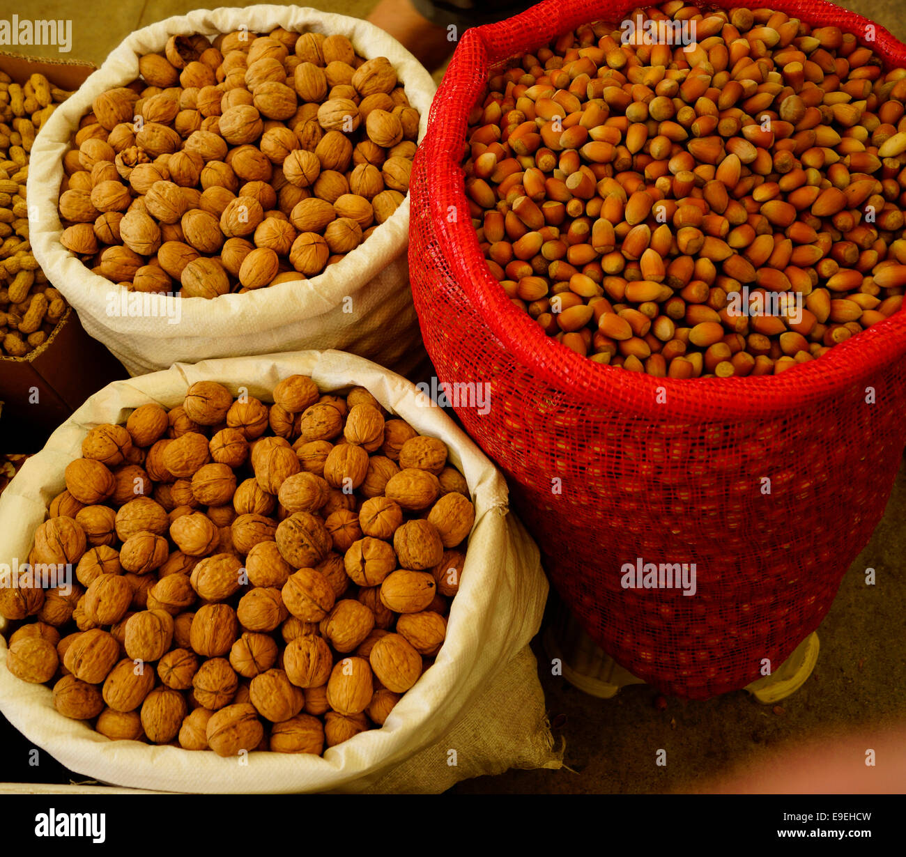 Walnuts and Hazelnuts - Freshly picked nuts waiting to be sold Stock ...