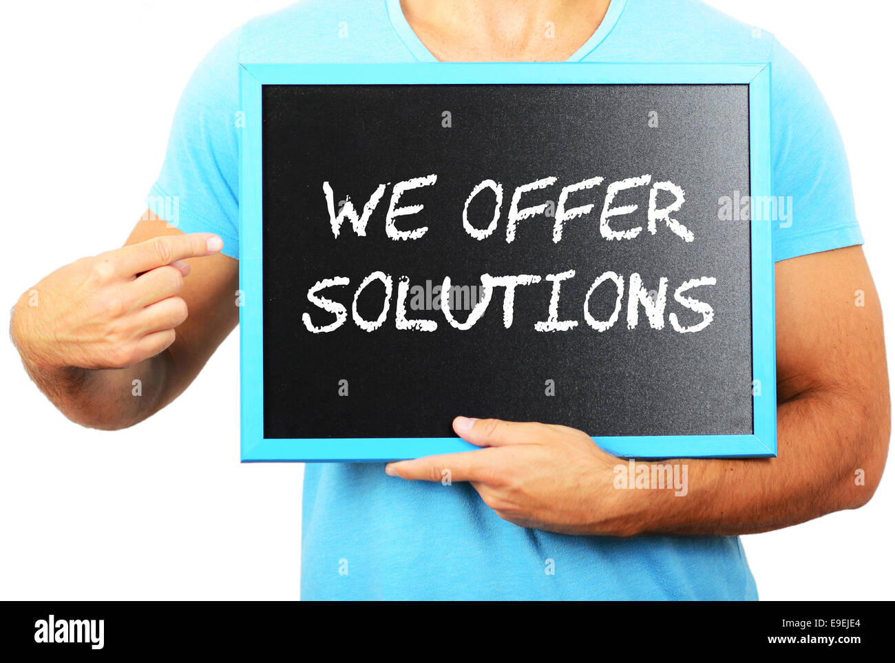 Man holding blackboard in hands and pointing the word WE OFFER ...
