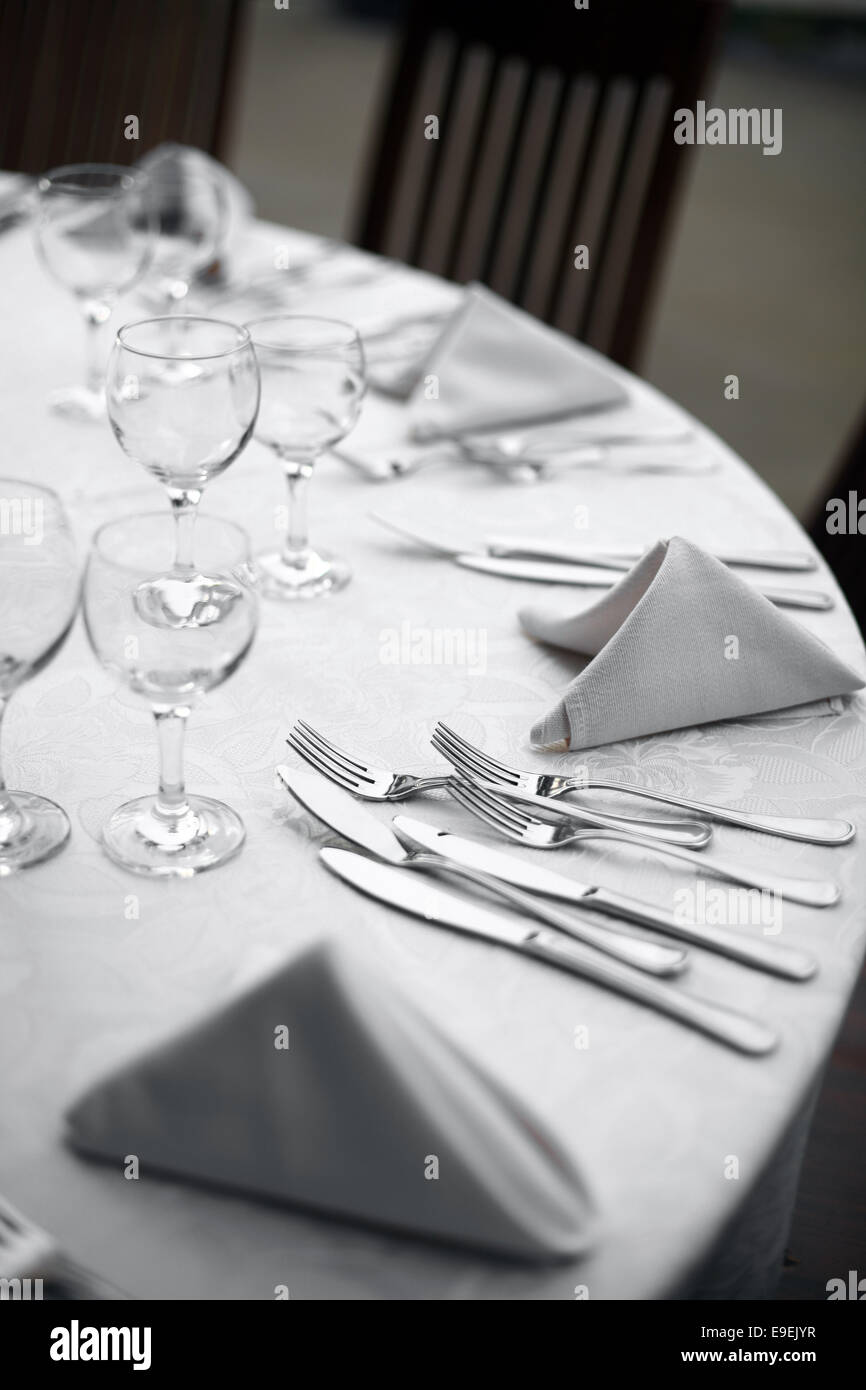 Shot with a dinner table in a restaurant Stock Photo - Alamy