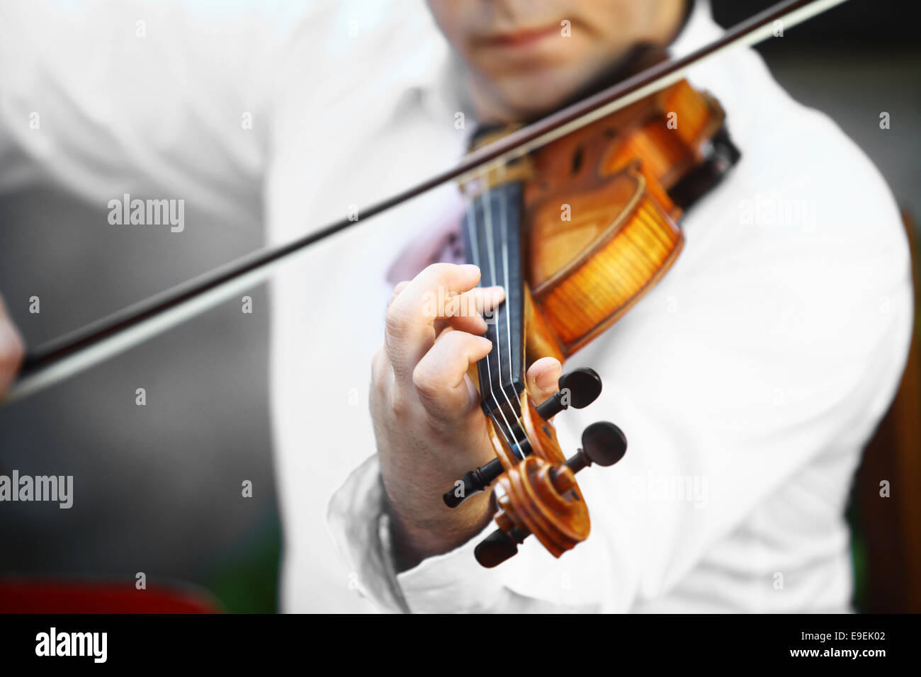 Detail of violin being played by a musician Stock Photo - Alamy