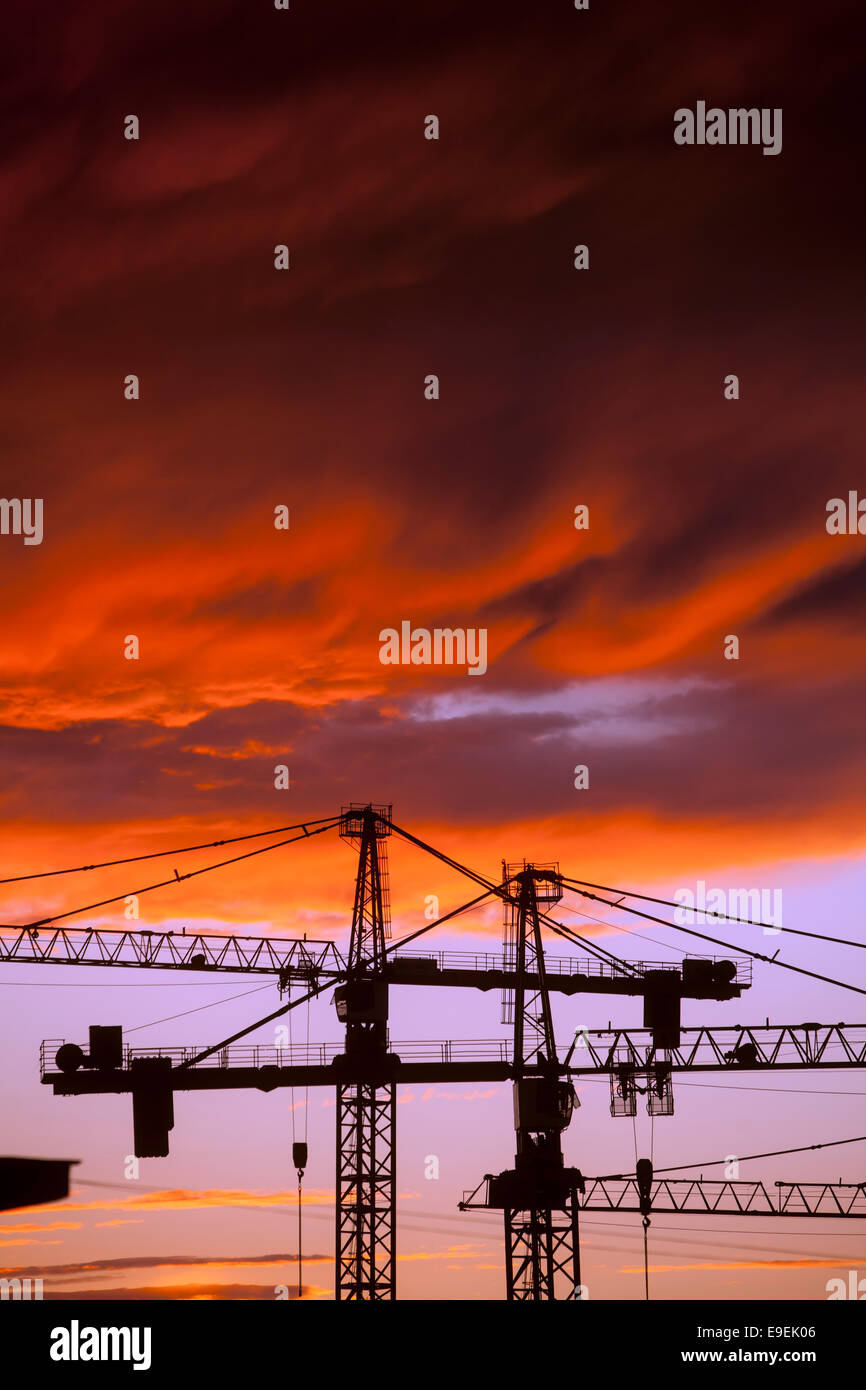 Color picture of some cranes on a construction site, as dusk Stock ...