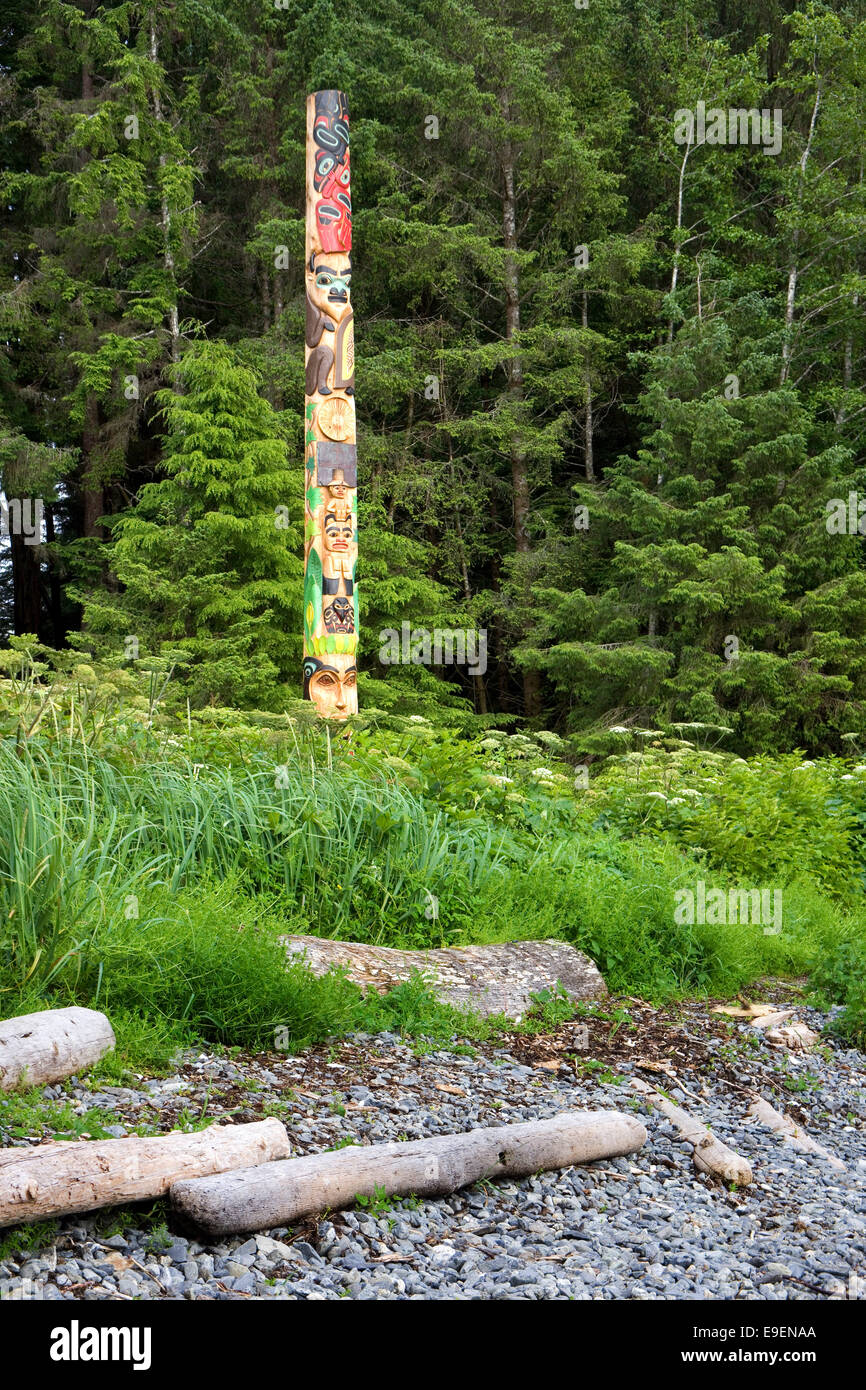 Wooch Jin Dul Shat Kooteeya totem pole stands by pebble beach, Sitka ...