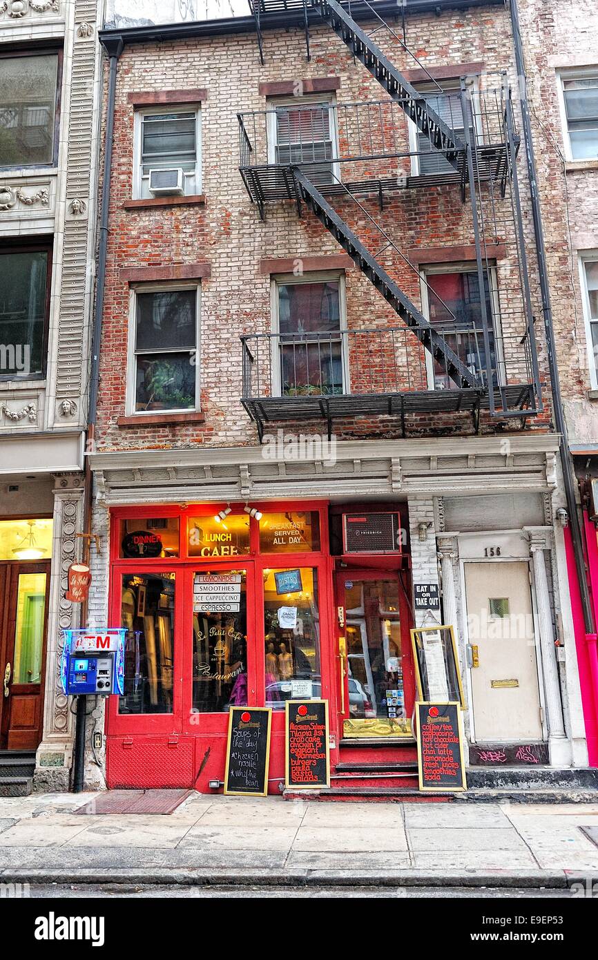 Old brick building with fire escape ladders in New York City Stock ...