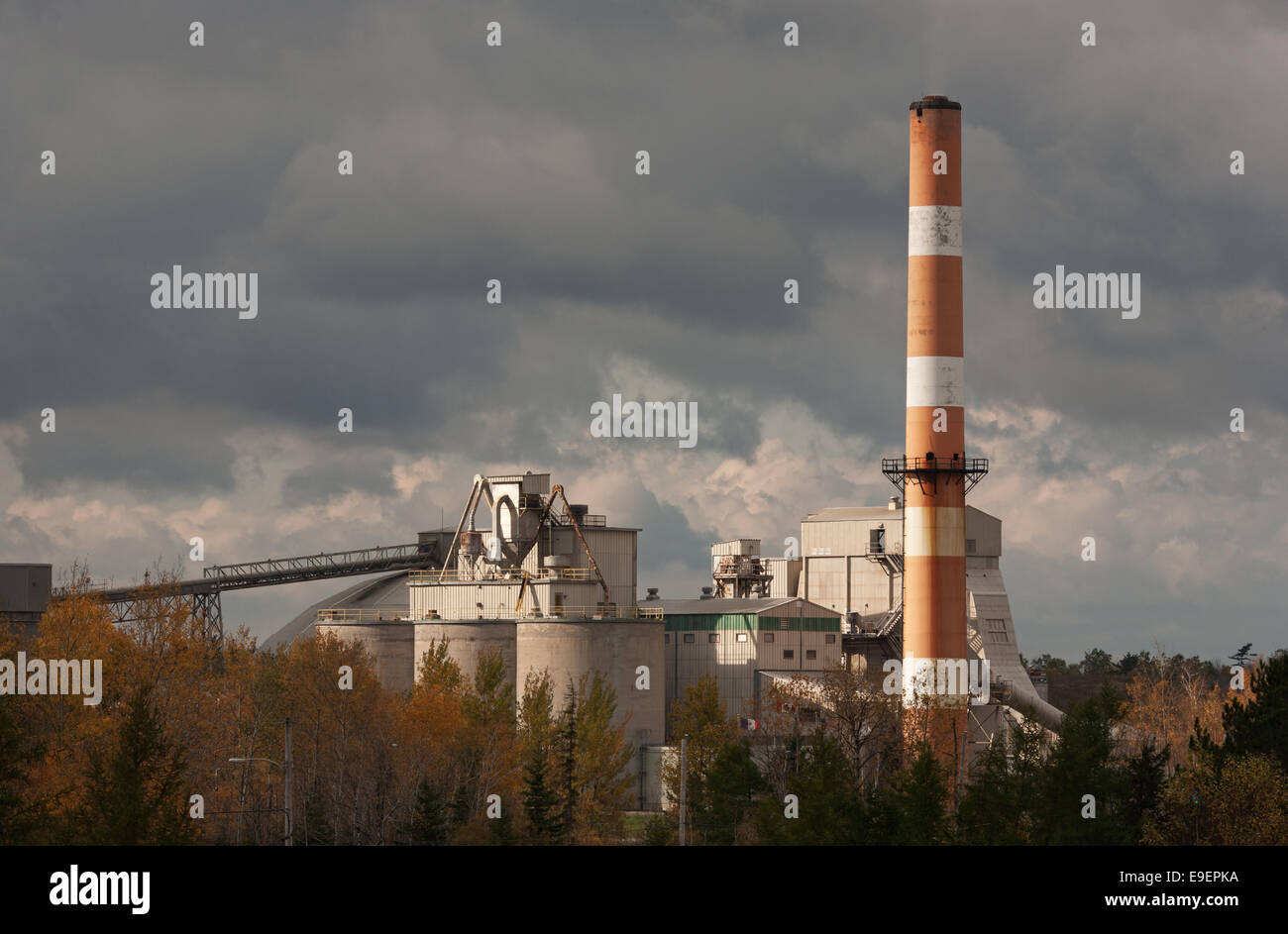 Industrial plant and dark skies Stock Photo - Alamy
