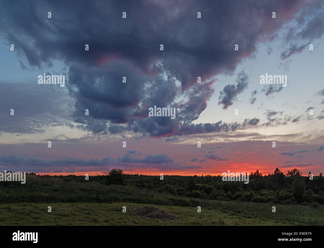 Red cloudy sunset Stock Photo - Alamy