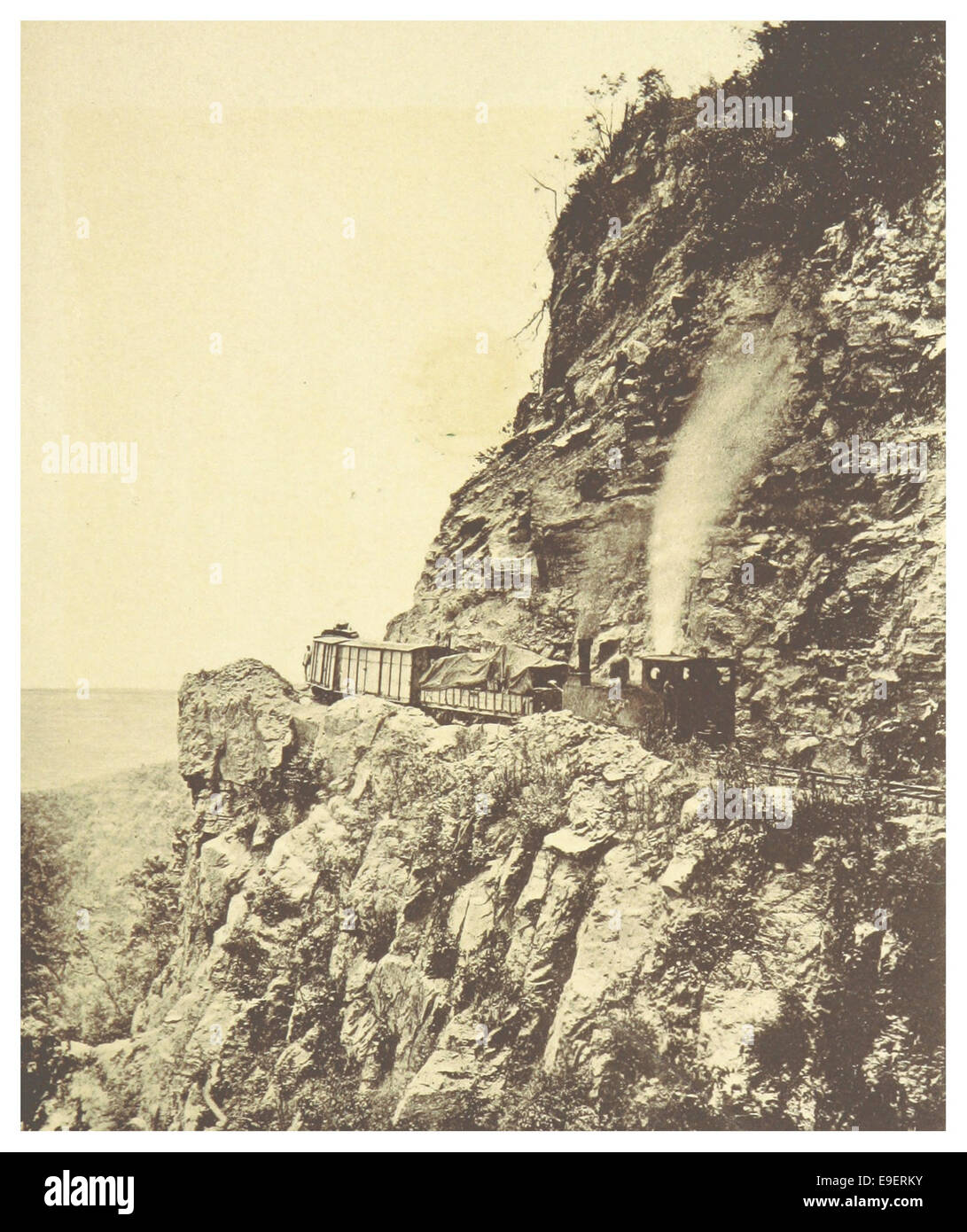 This image depicts a train on the railway track from La Guaira Harbor ...