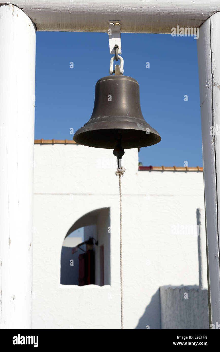 Bronze bell hanging on wooden pillar Stock Photo - Alamy