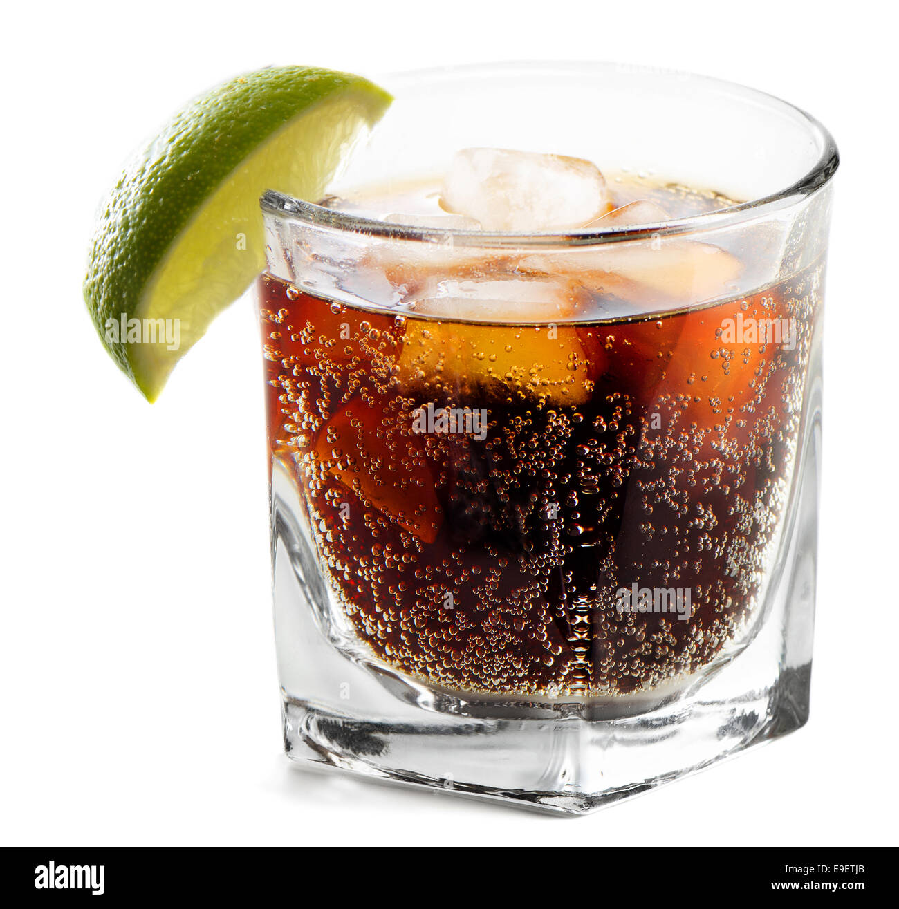 Cocktail with lime and cola isolated on white background Stock Photo ...