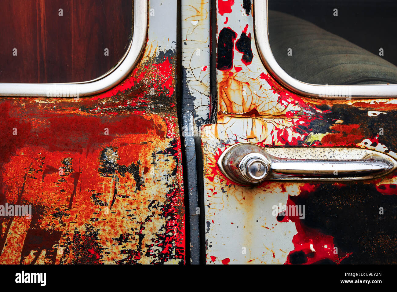 Detail close-up image of rusty old car door with handle and lock Stock ...
