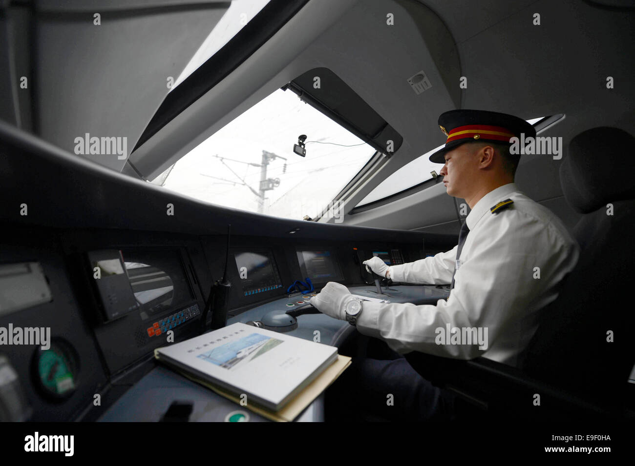 Hangzhou, Jiangxi Province. 27th Oct, 2014. A high-speed train driver ...