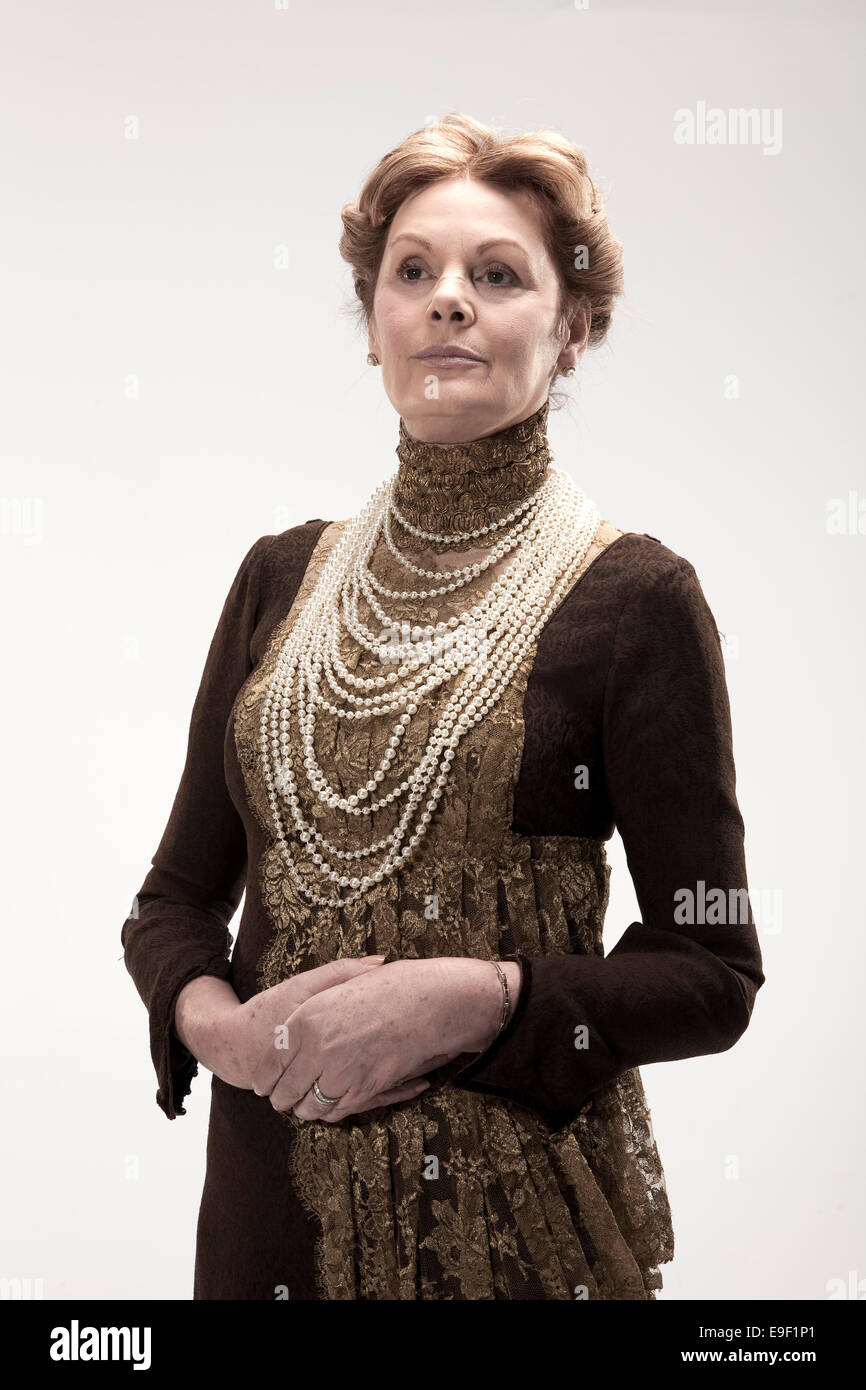 Historical looking Edwardian man, woman, people in dinner jackets ...