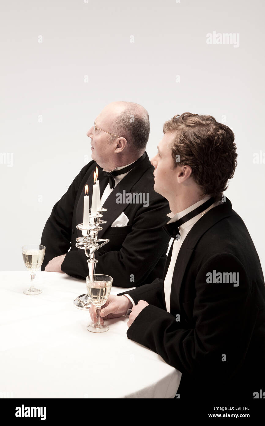 Historical looking Edwardian man, woman, people in dinner jackets ...