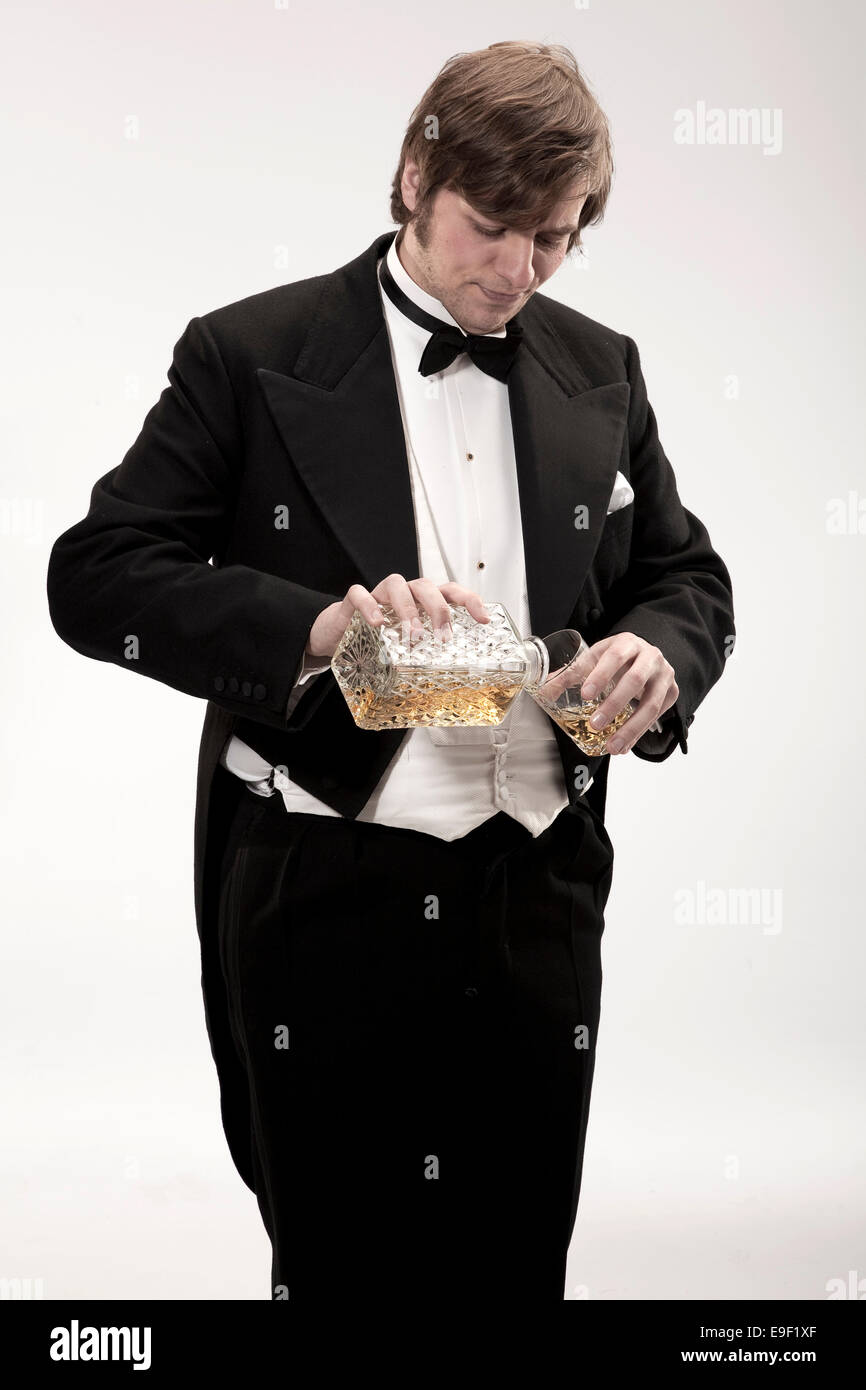 Historical looking Edwardian man, woman, people in dinner jackets ...