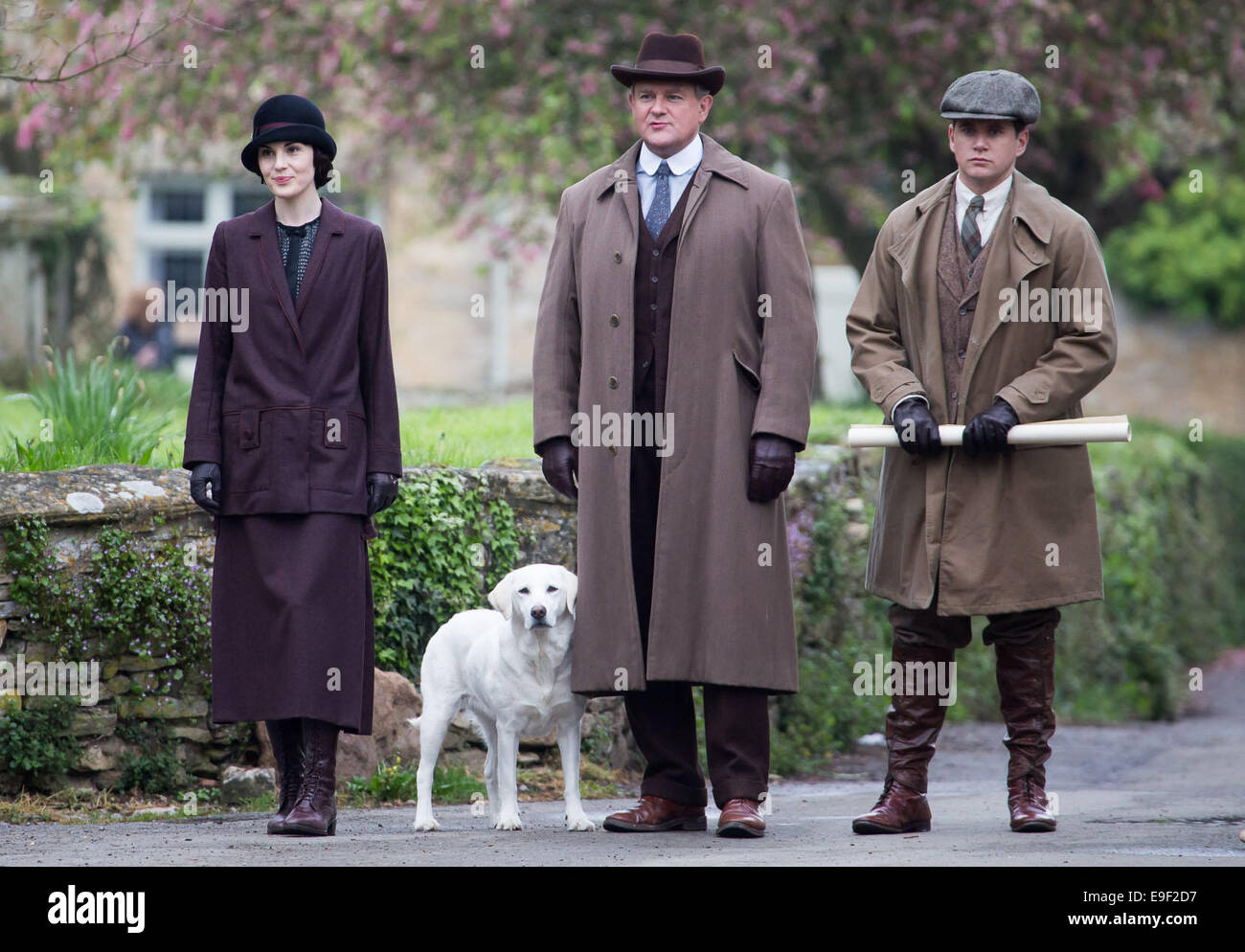 The cast of Downton Abbey film scenes on location outside a churchyard ...