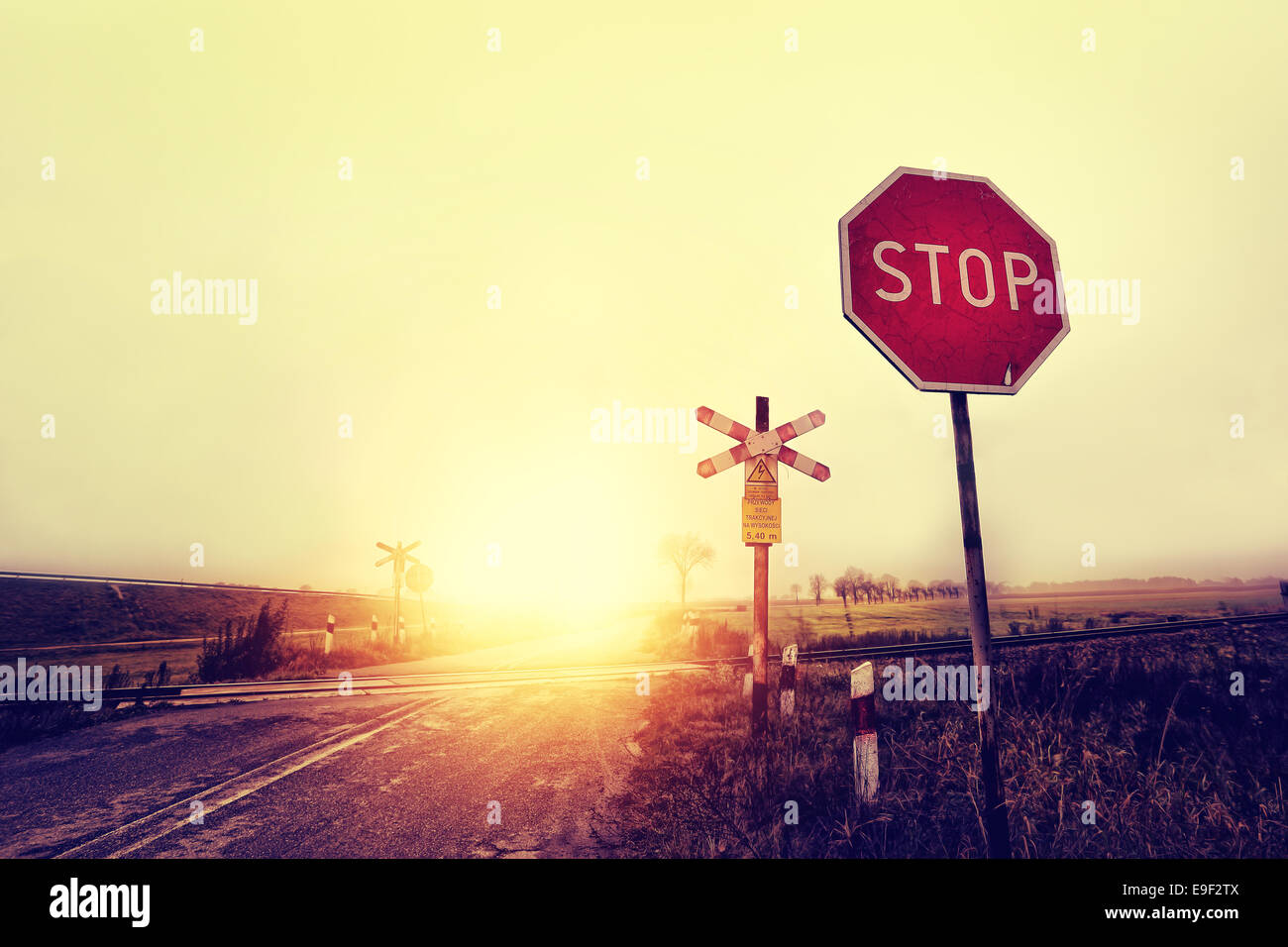 Unguarded railway crossing road sign hi-res stock photography and ...