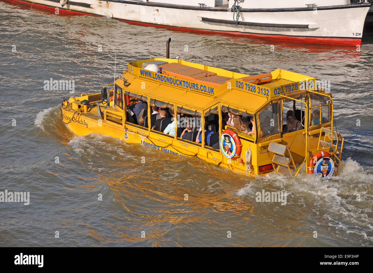 London Duck Tours - a distinctive yellow amphibious tour boat with ...