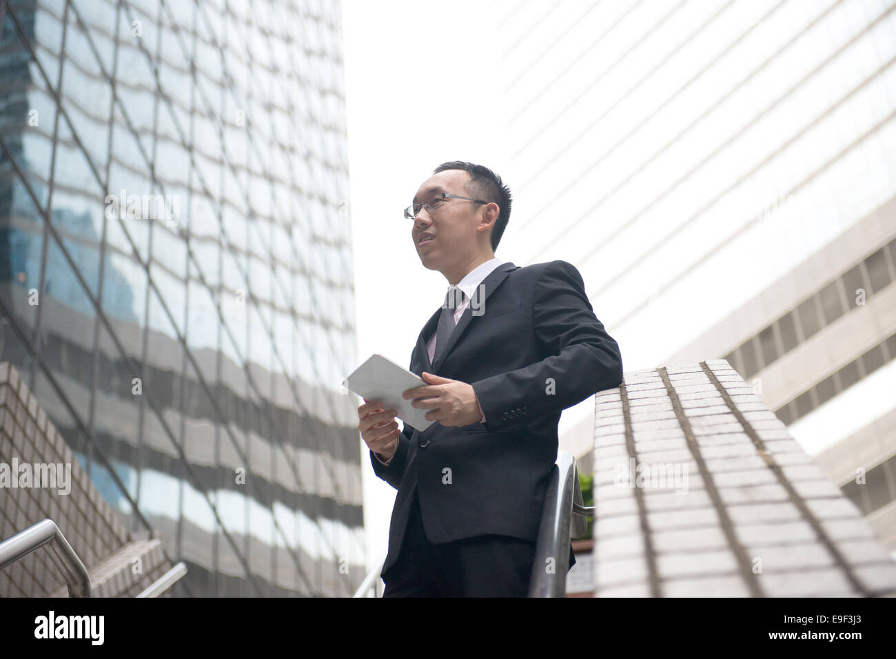 Chinese businessman on computer hi-res stock photography and images - Alamy