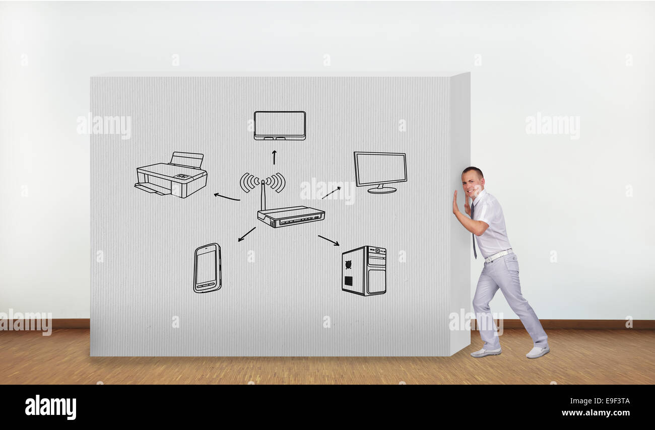 businessman pushing concrete wall with computer network Stock Photo - Alamy