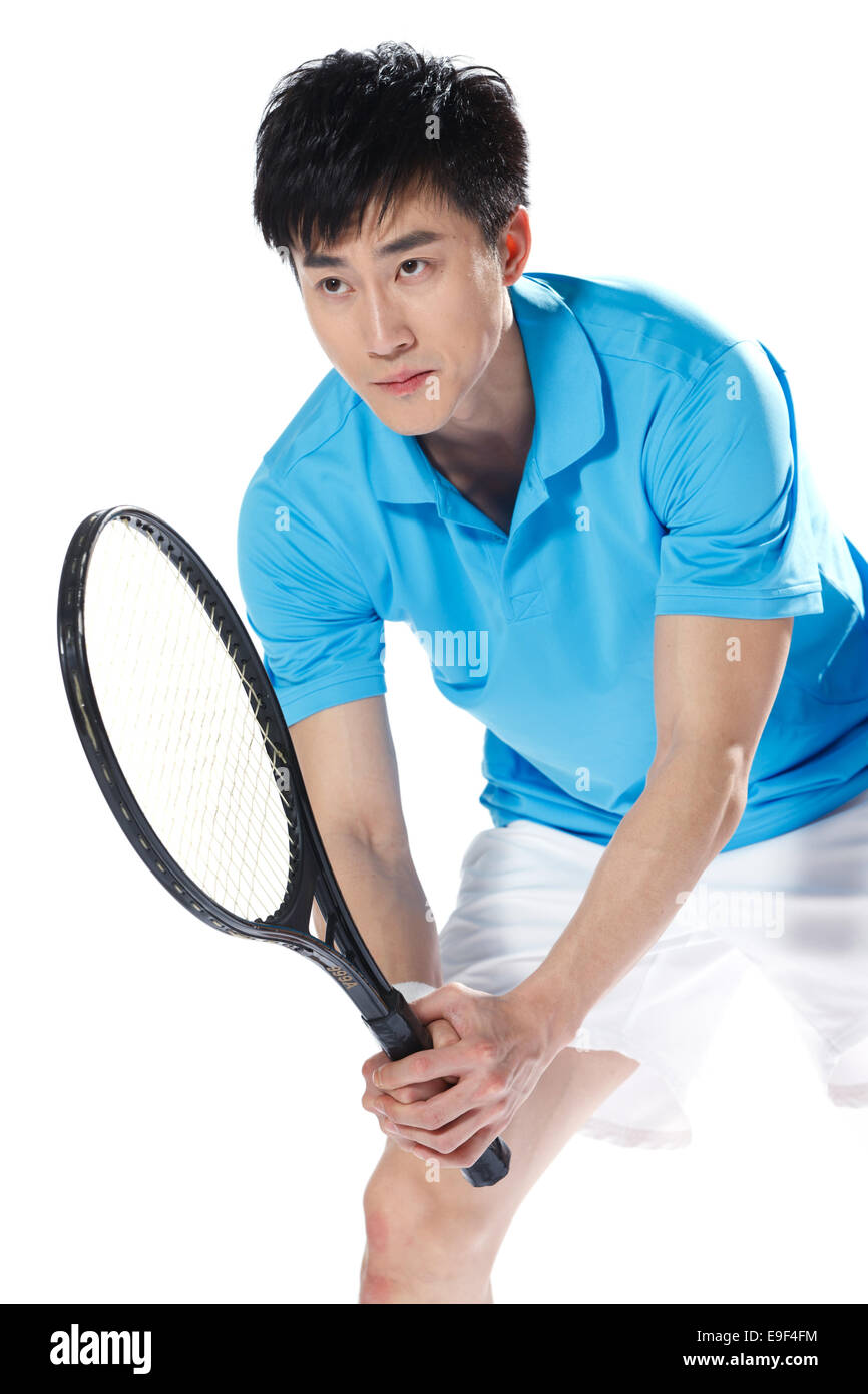 Male athletes playing tennis Stock Photo - Alamy