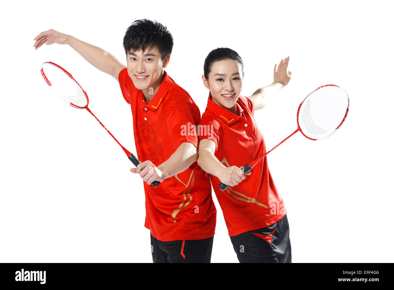 Athletes playing badminton Stock Photo - Alamy
