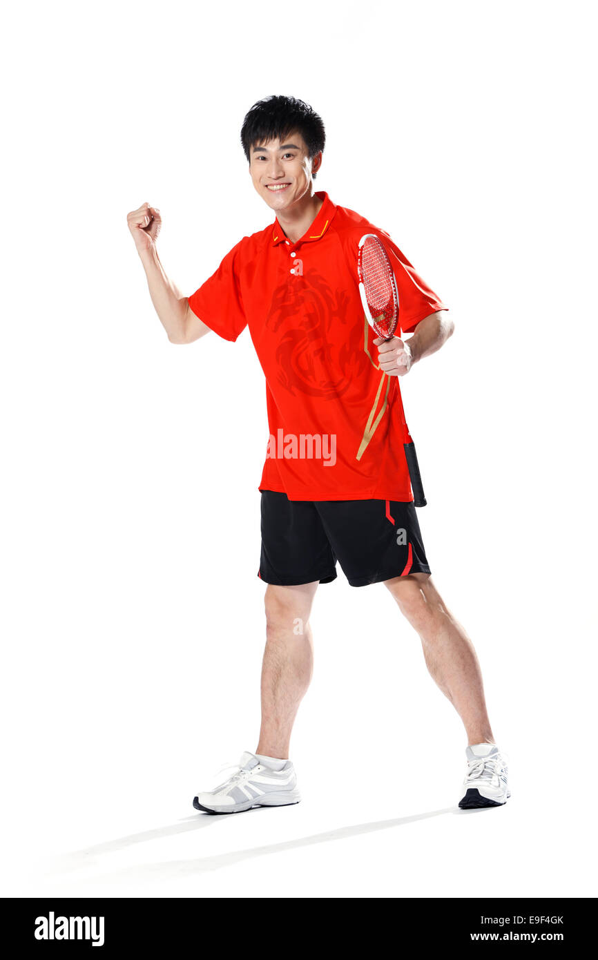 Male athletes playing badminton Stock Photo - Alamy