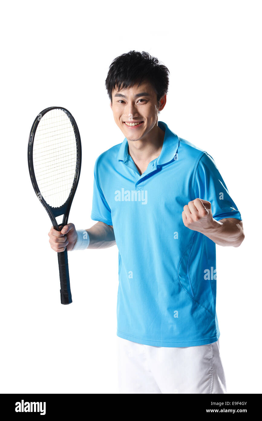 Male athletes playing tennis Stock Photo - Alamy