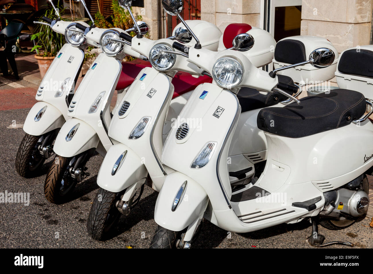 Row of scooters hi-res stock photography and images - Alamy