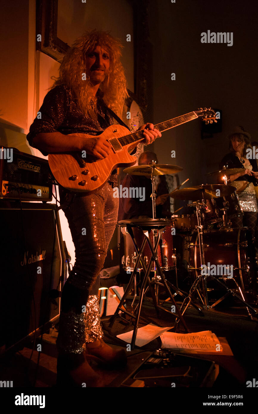 A glam rock David Bowie tribute band perform the entire 'Ziggy Stardust ...