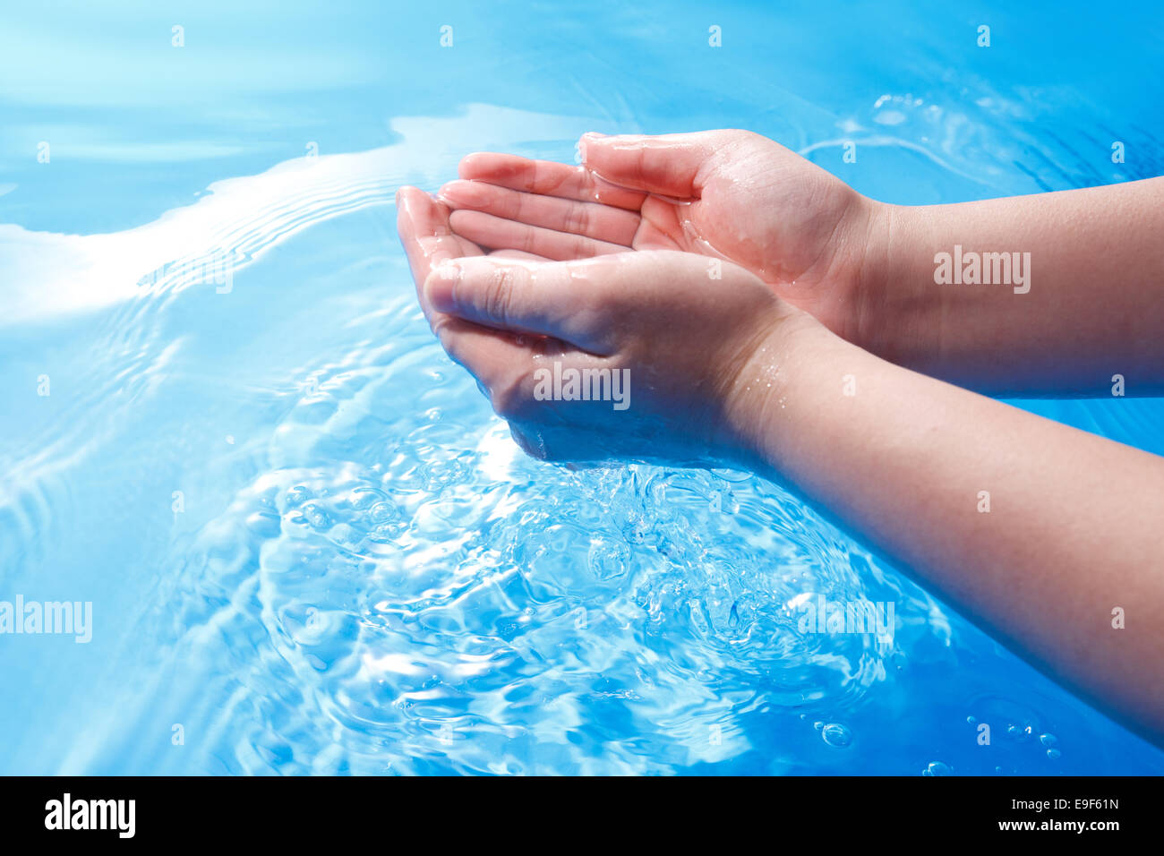 Cupped hands holding water hi-res stock photography and images - Alamy
