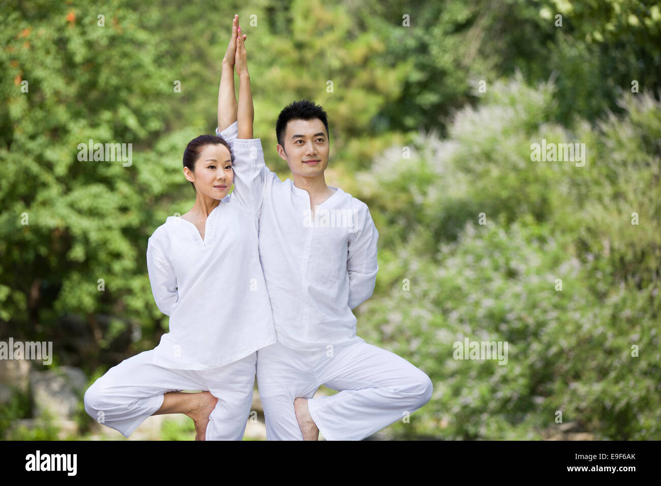 Young adult practicing yoga Stock Photo - Alamy