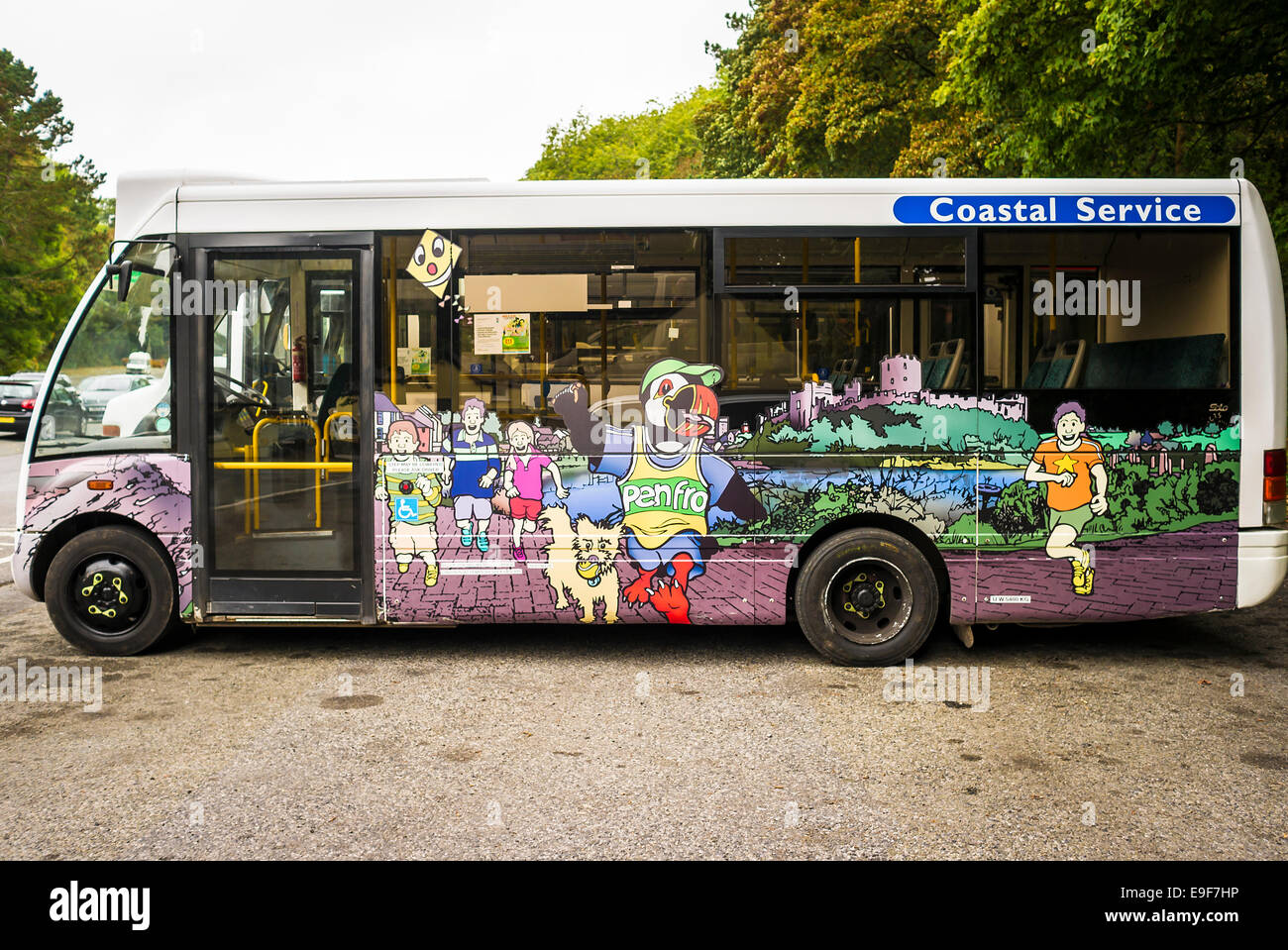 Public service bus with illustrative mural on its side Stock Photo - Alamy