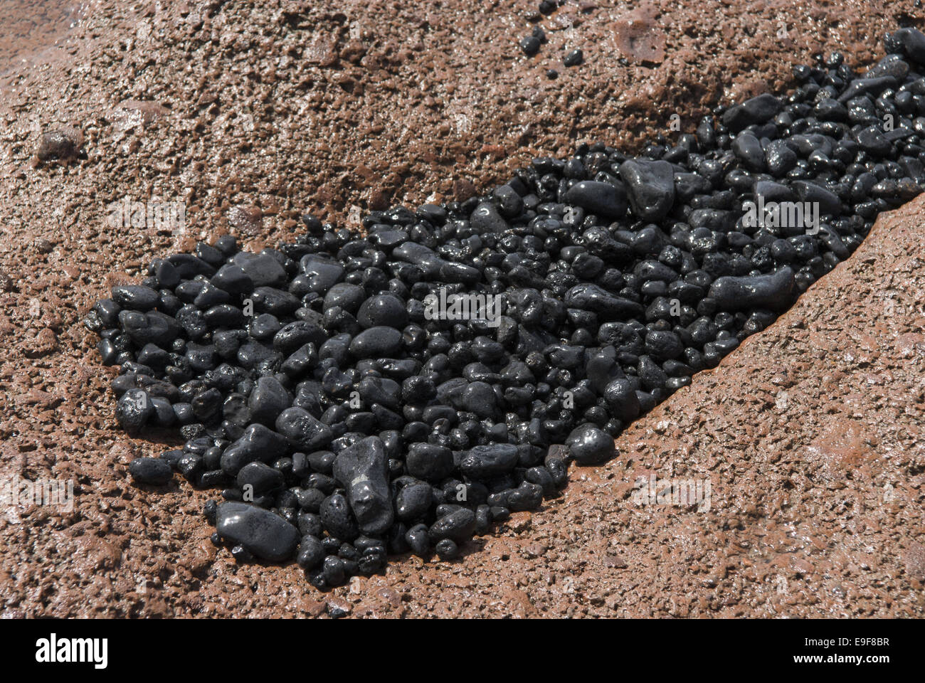Black Lava pebbles near El Golfo, Lanzarote Stock Photo - Alamy