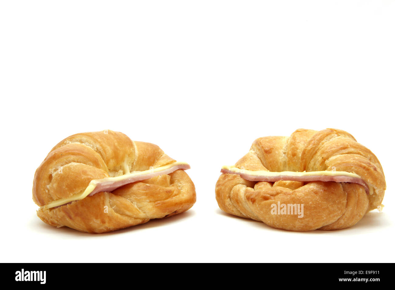 two Ham Cheese croissant on white Stock Photo - Alamy