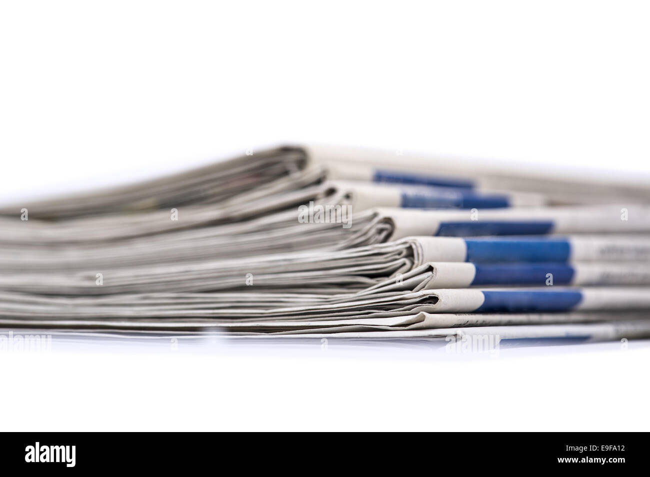Stack of newspapers Stock Photo - Alamy