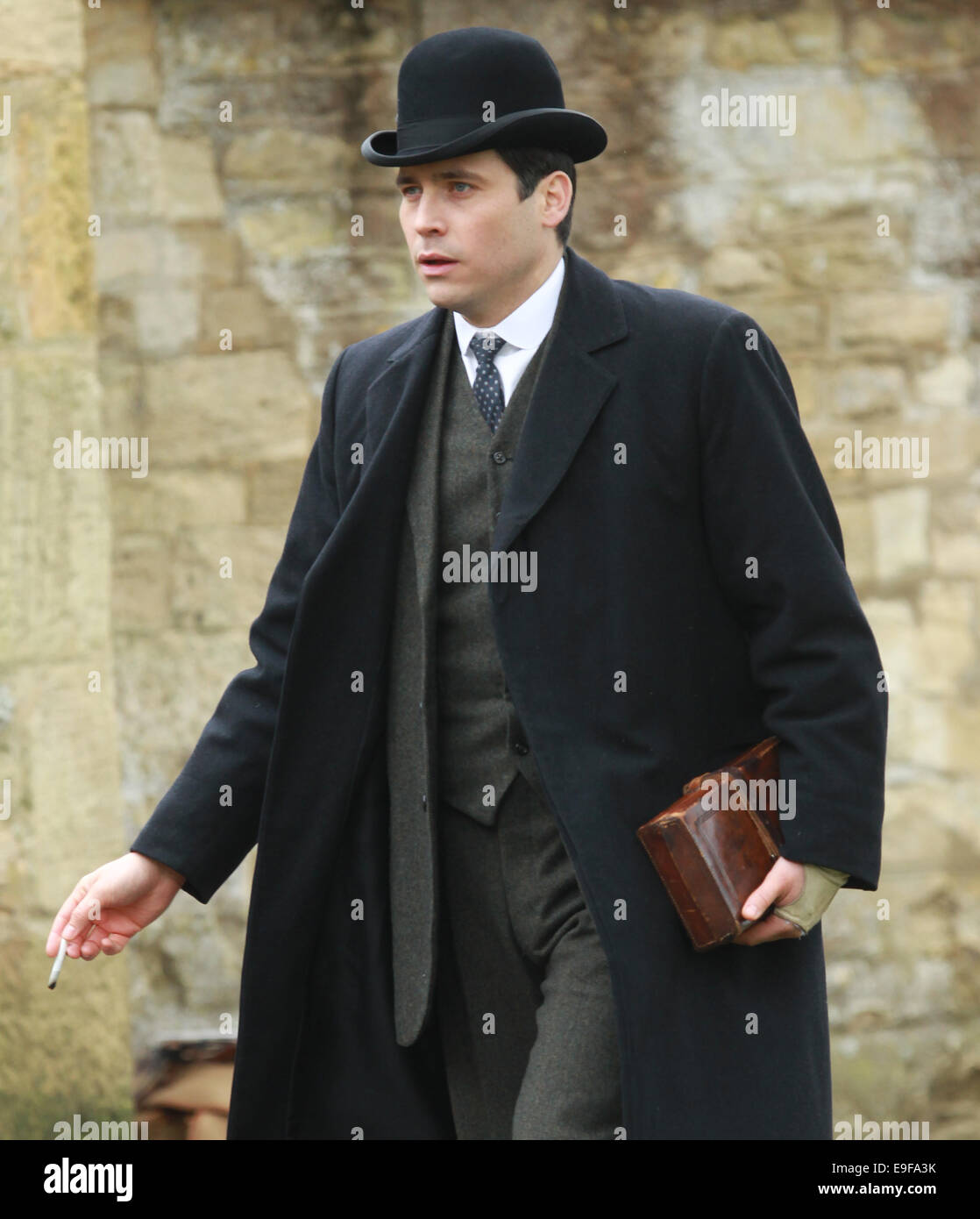 The cast of Downton Abbey film scenes on location outside a churchyard ...