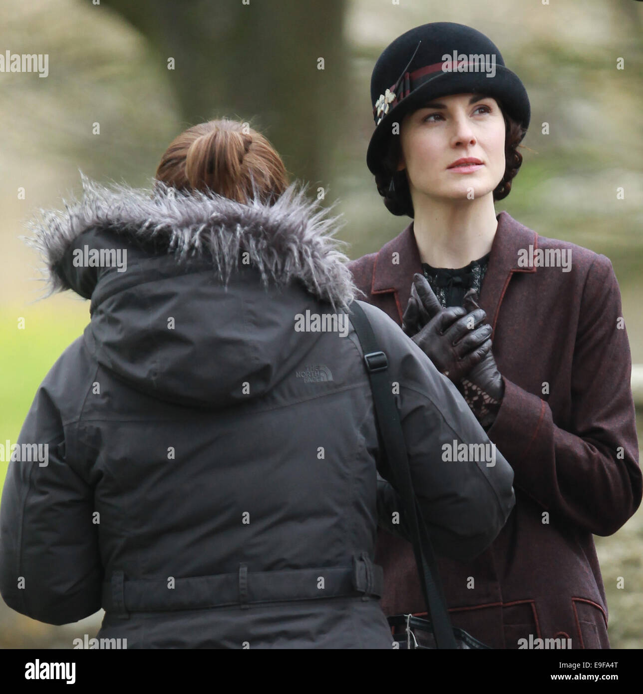 The cast of Downton Abbey film scenes on location outside a churchyard ...