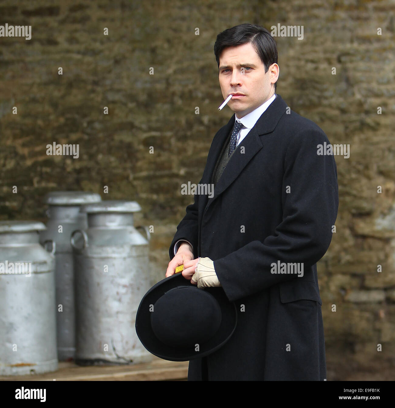 The cast of Downton Abbey film scenes on location outside a churchyard ...