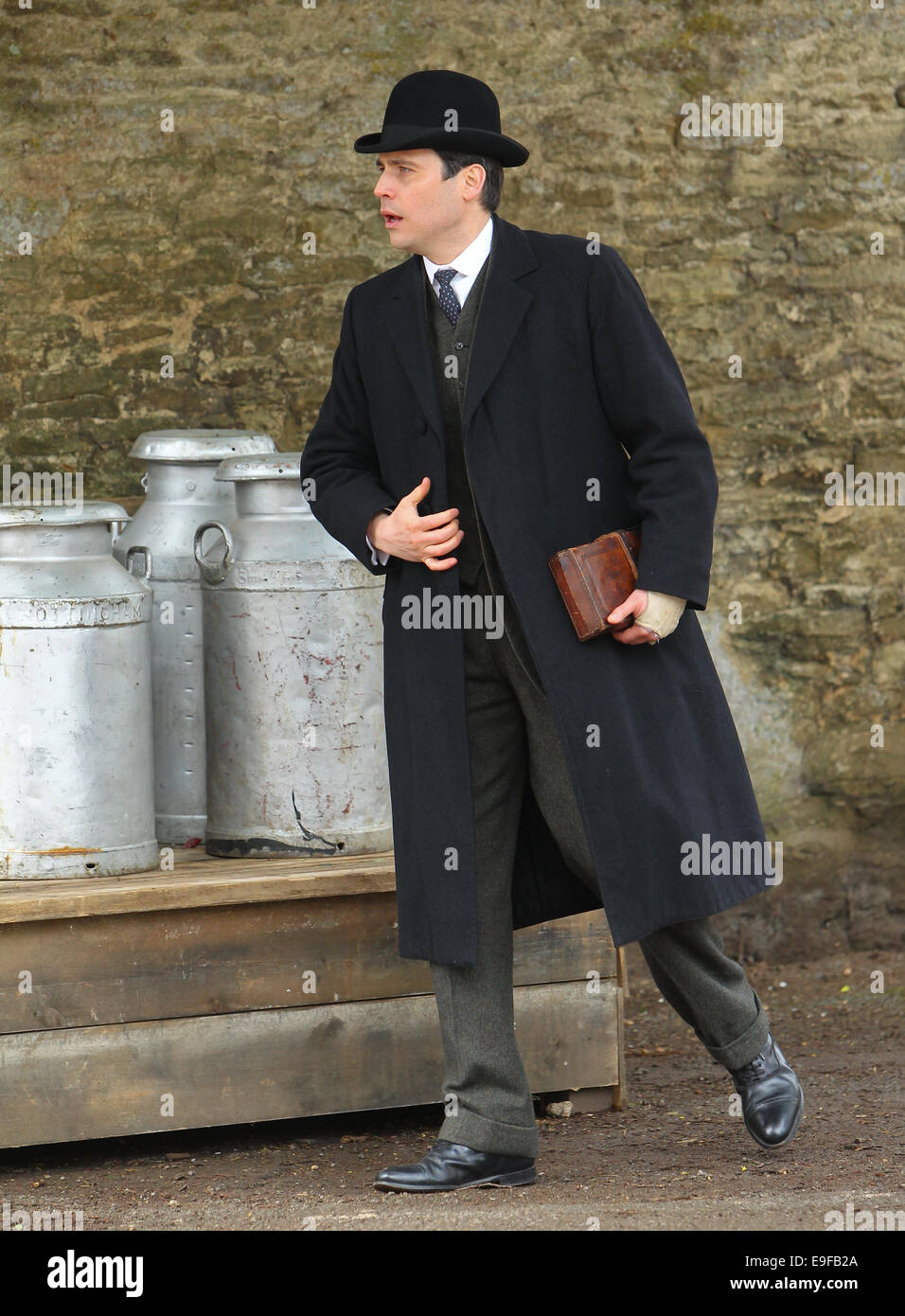 The cast of Downton Abbey film scenes on location outside a churchyard ...