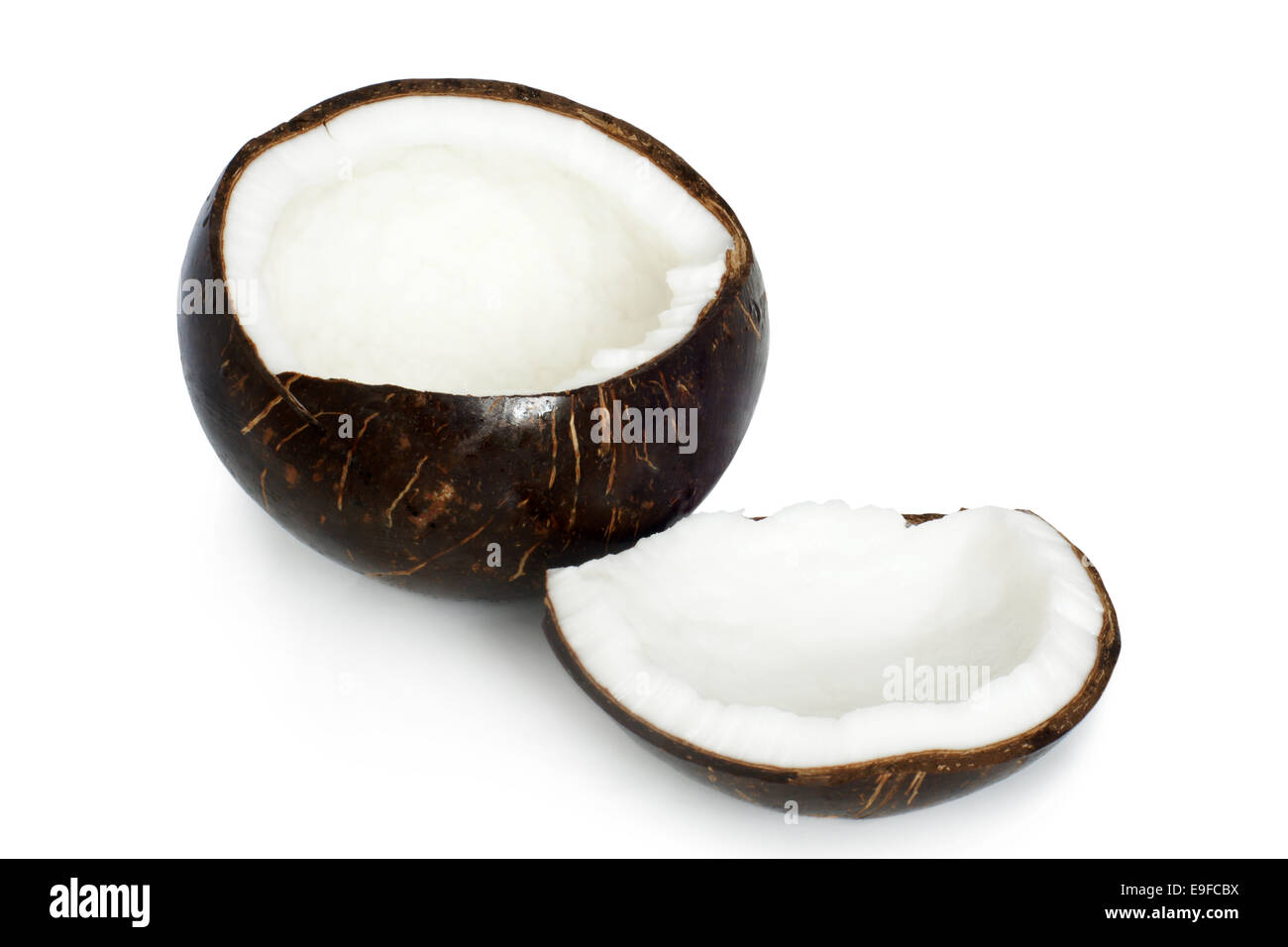 Two halves of coconut Stock Photo - Alamy