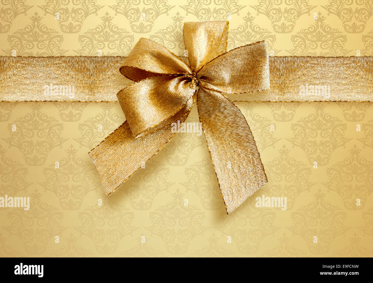 Damask Background With Gold Bow Stock Photo - Alamy