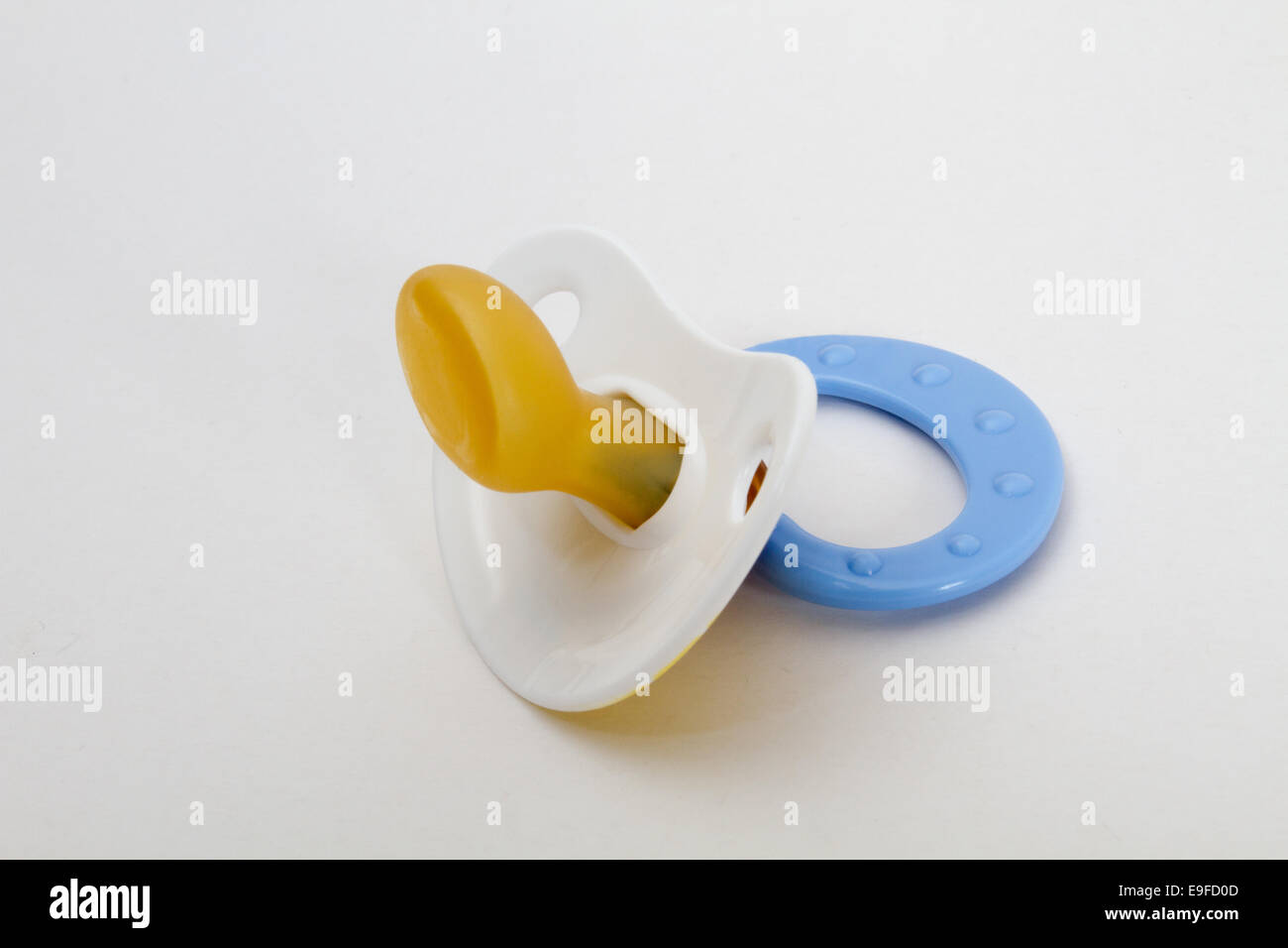 Pacifier on white Stock Photo - Alamy