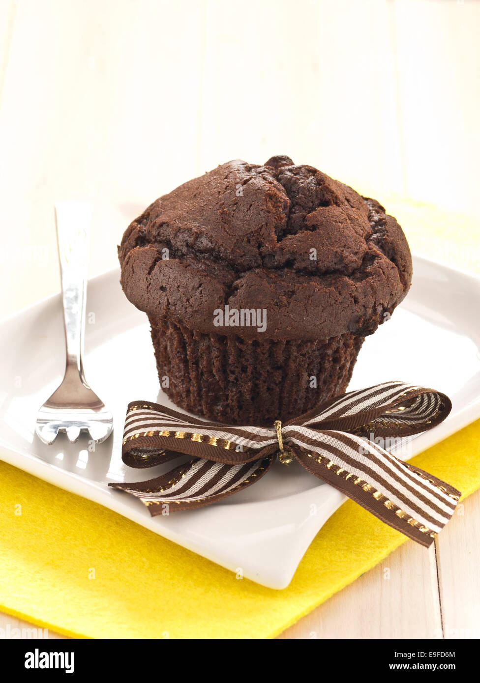 Chocolates Cupcake on a plate Stock Photo - Alamy