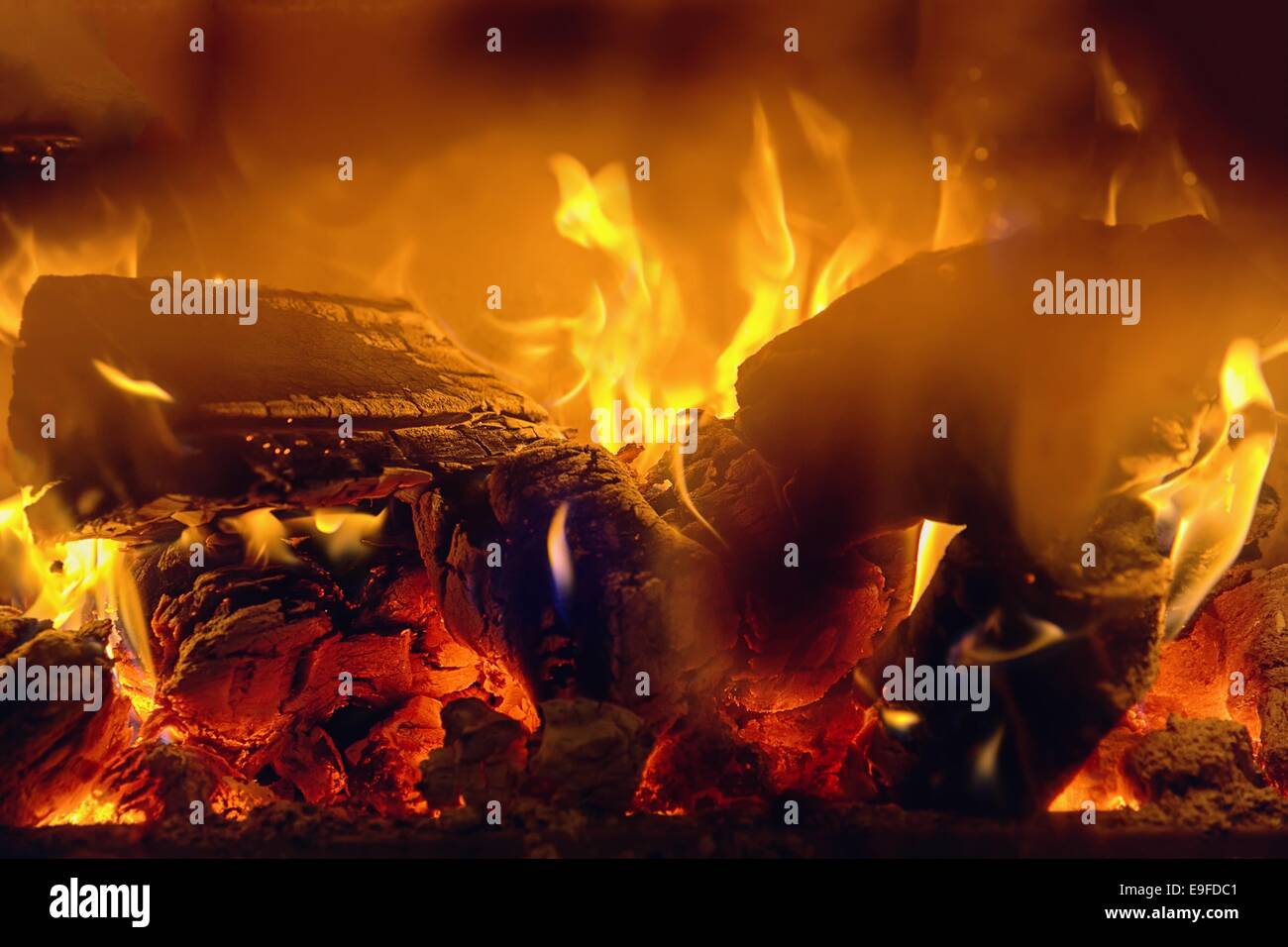 A small fire in the fireplace to smoke Stock Photo - Alamy